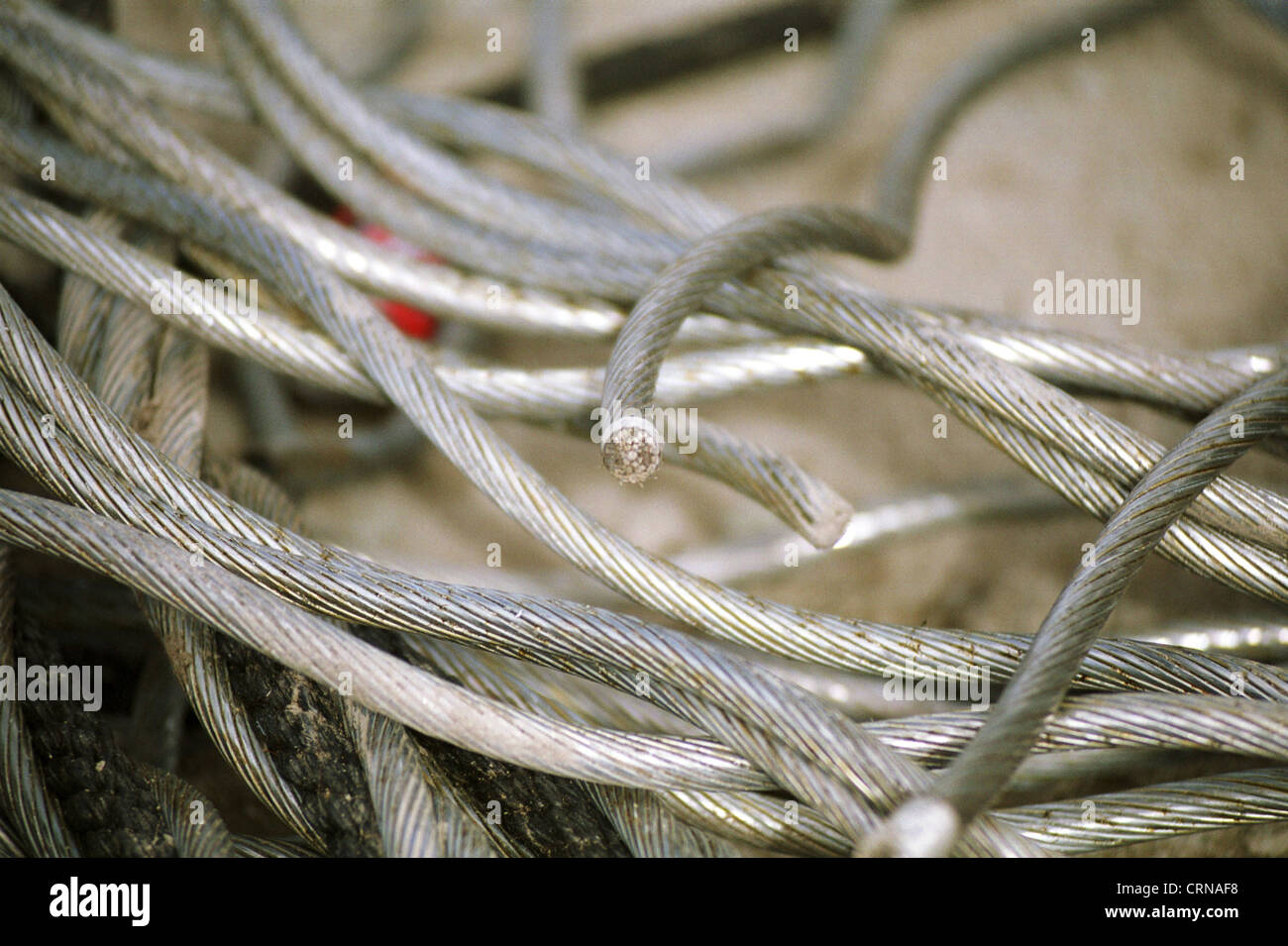 Rolled up steel cables hi-res stock photography and images - Alamy