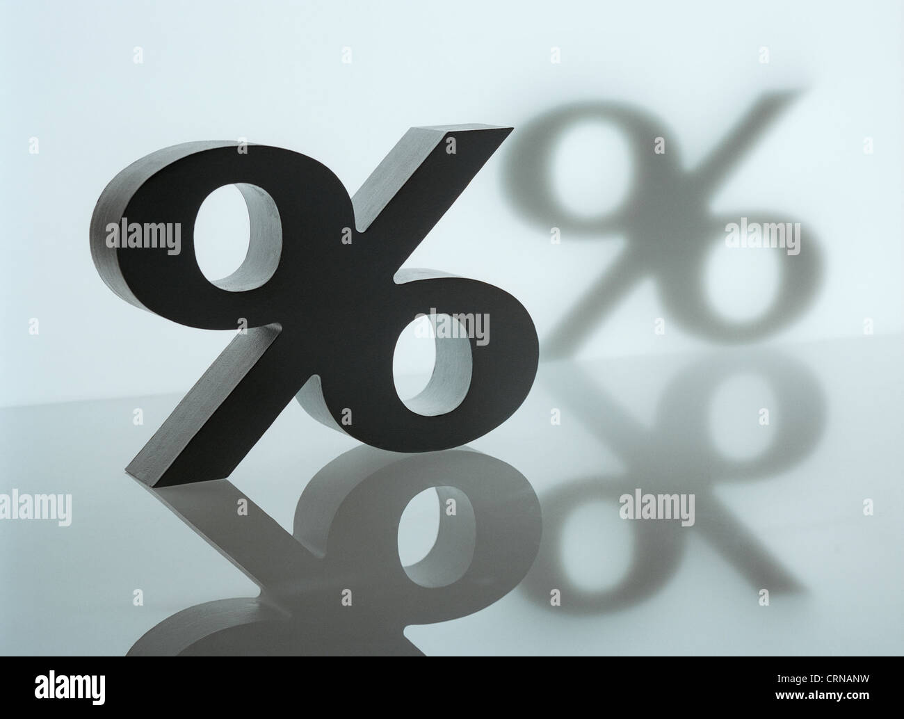 Two percent sign on a reflective surface Stock Photo - Alamy
