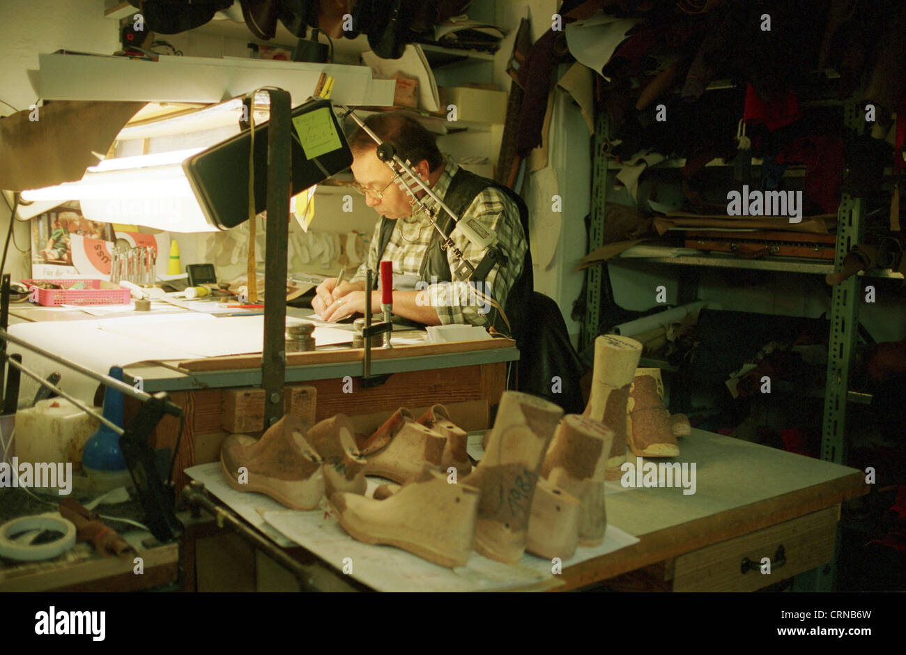 Orthopedic-shoemaker's workshop in Berlin Stock Photo - Alamy