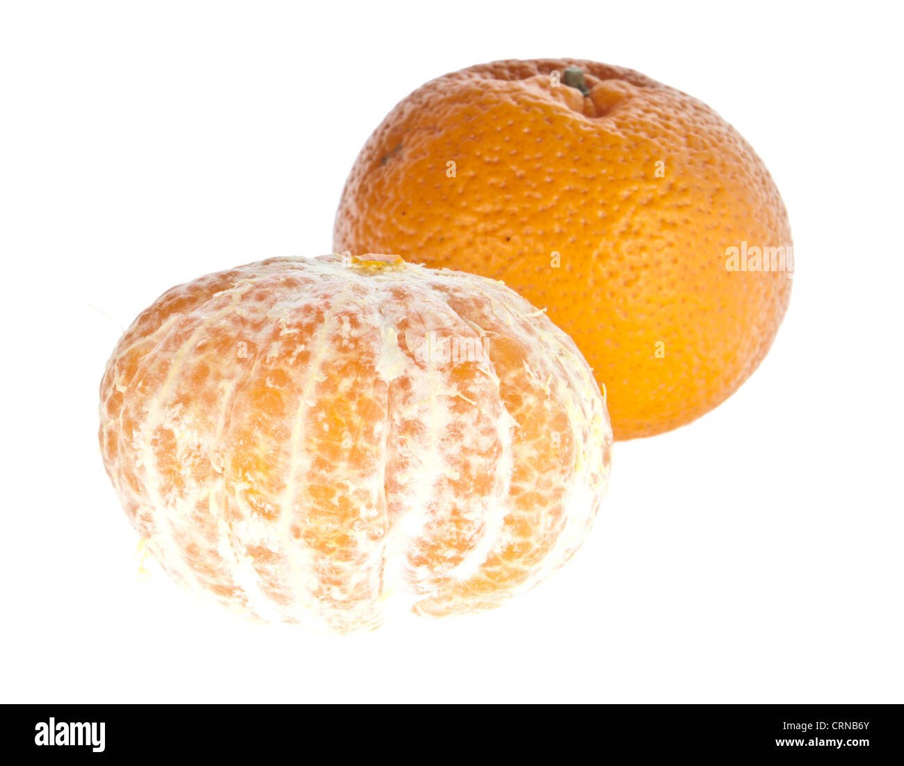 Two Tangerines (one peeled) isolated on white background Stock Photo ...