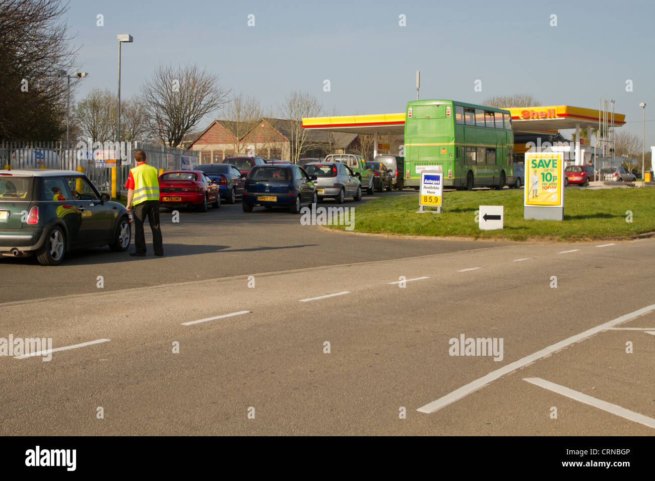 Cars queued for fuel during proposed tanker driver strike panic buying ...