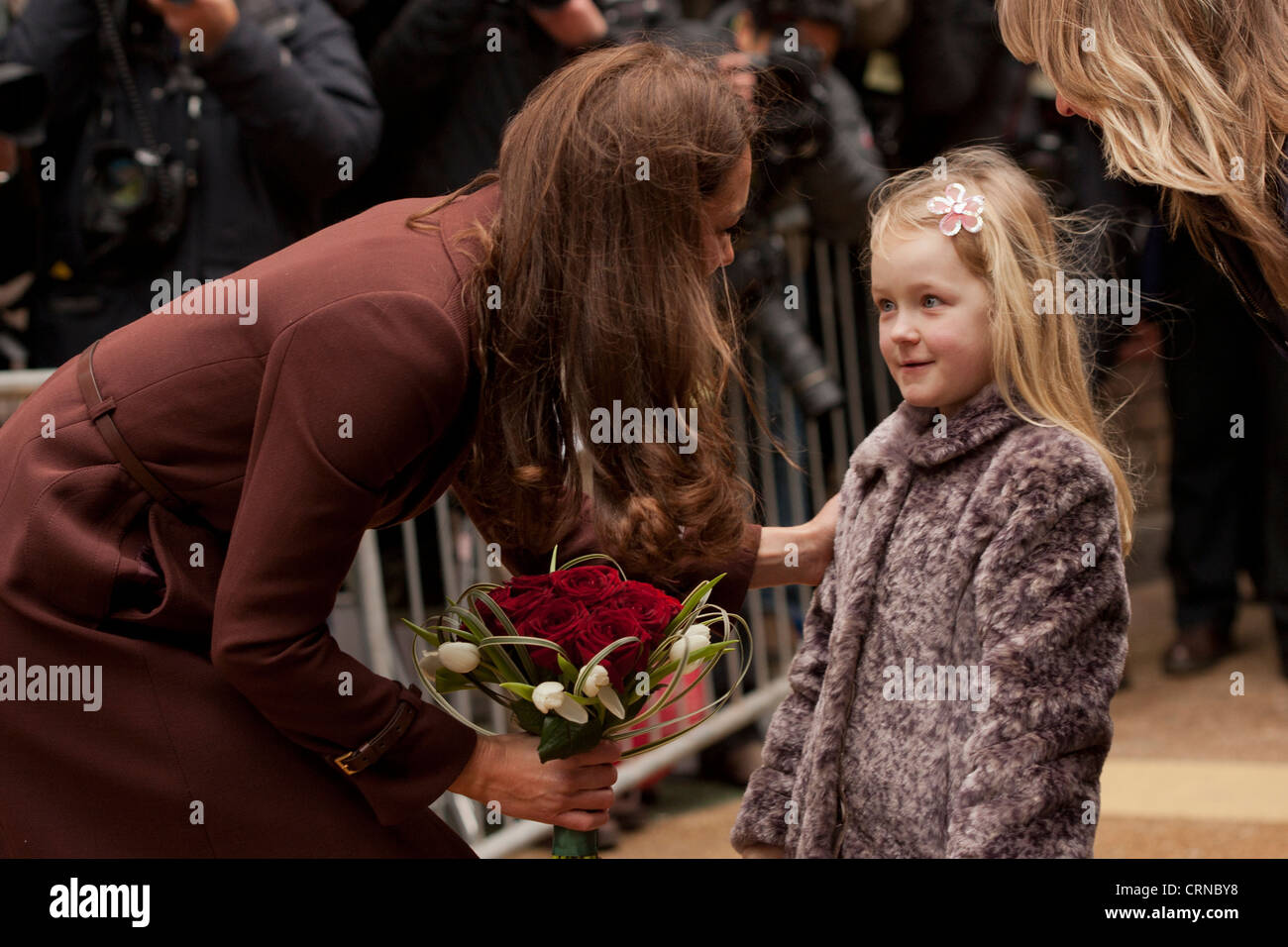 Duchess of Cambridge is presented with flowers from 8 year old Aimee ...
