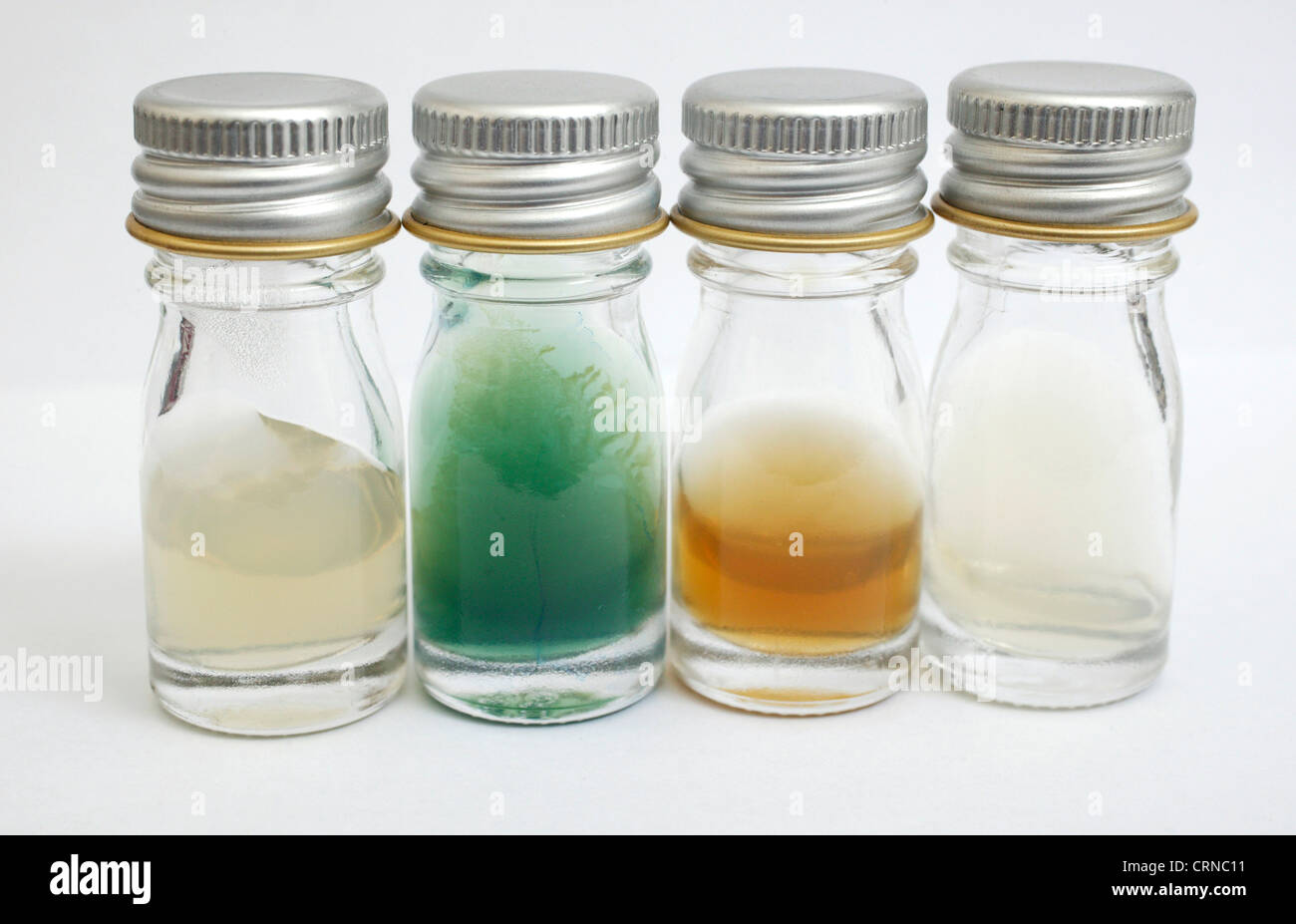 Coloured glass bottles hi-res stock photography and images - Alamy