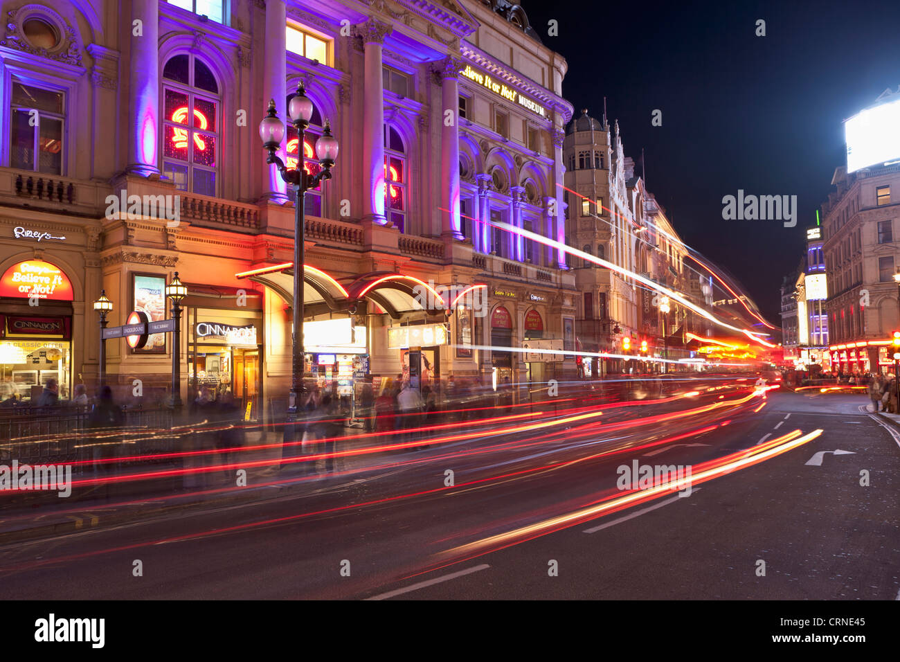 The London Pavilion and light trails at night, Piccadilly Circus ...