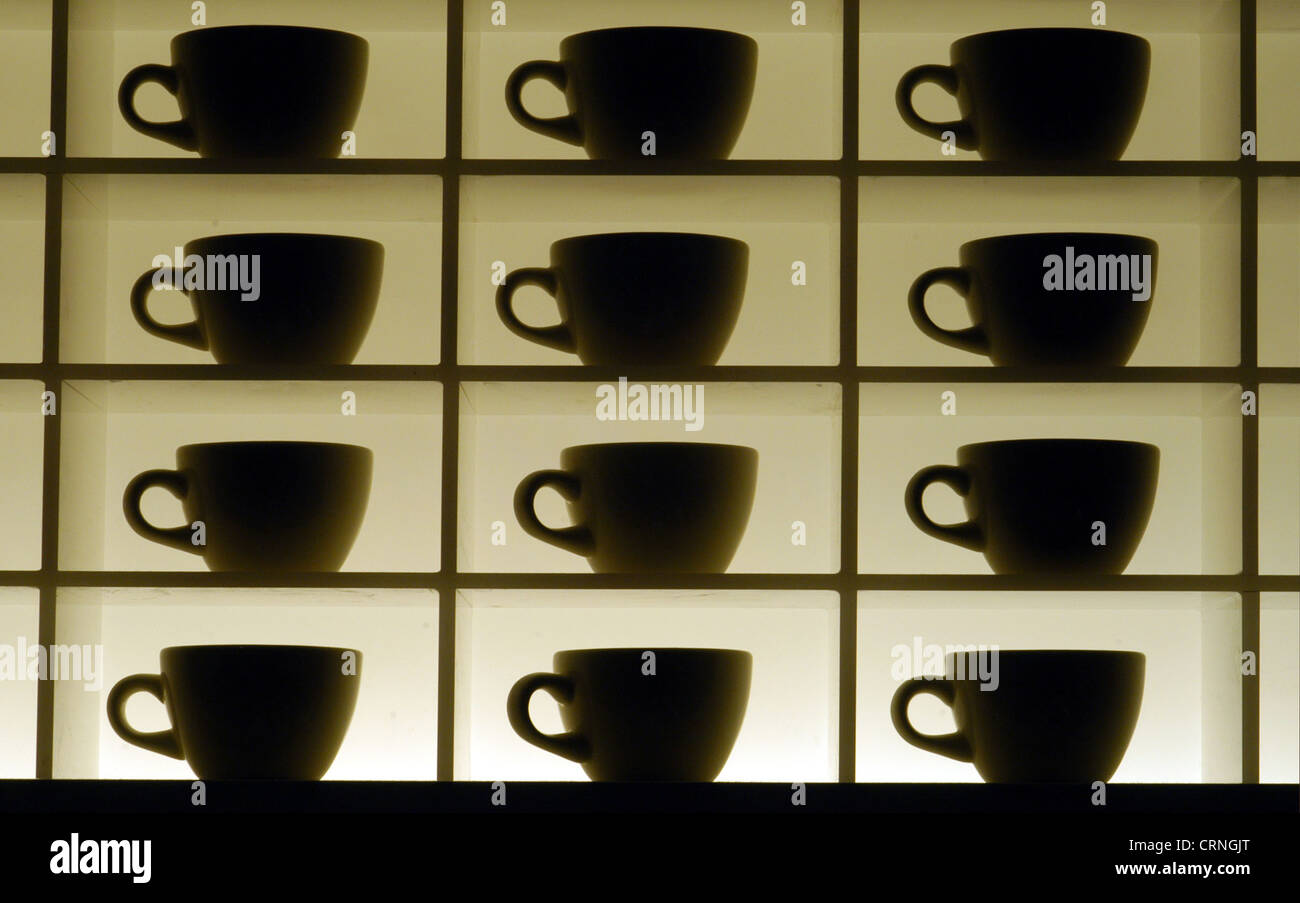 Cups on the shelf Stock Photo - Alamy
