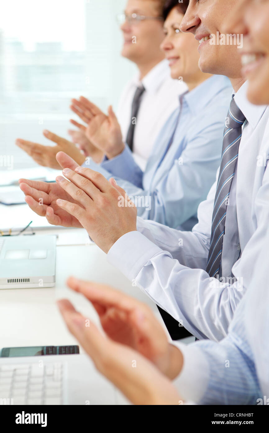 Vertical shot of applauding business people Stock Photo - Alamy
