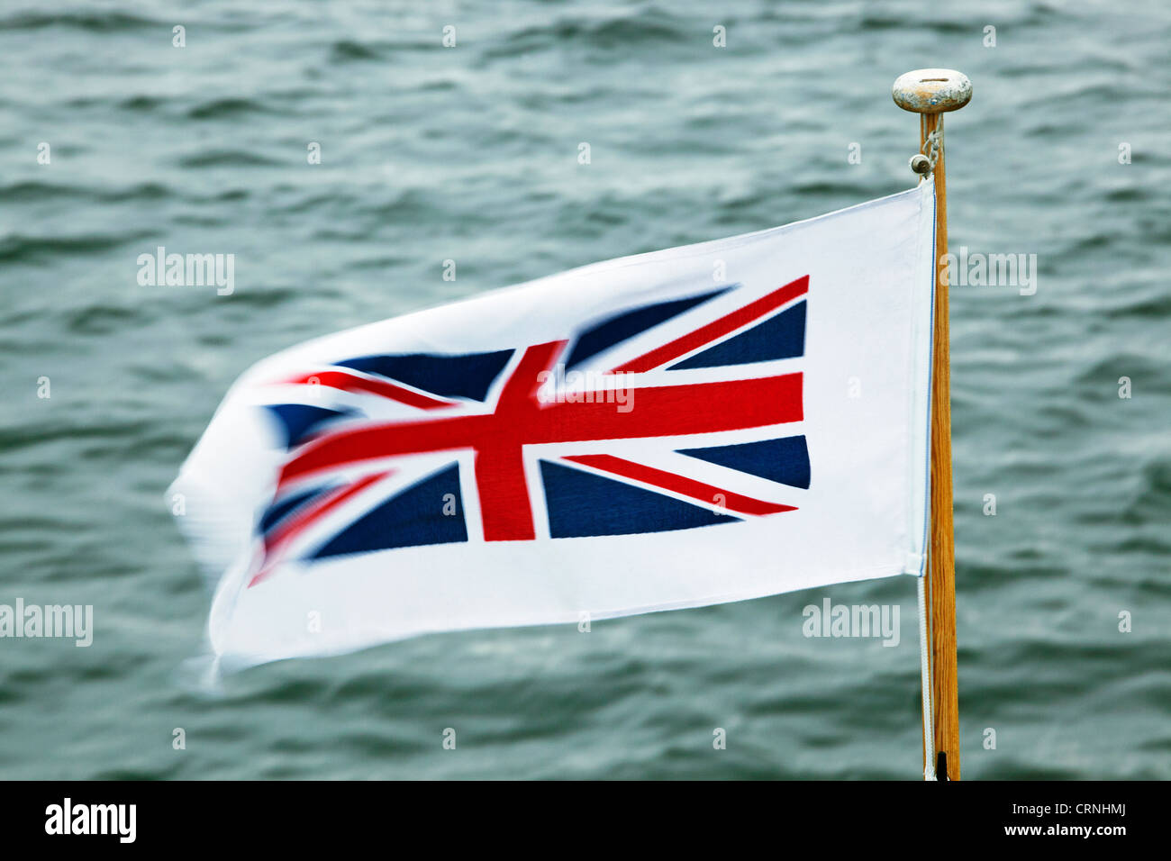 Union jack flag flying on mast hi-res stock photography and images - Alamy