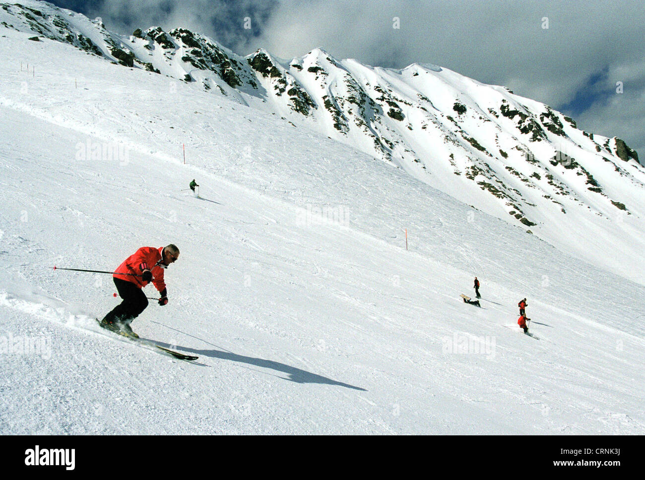 Skier on a slope, cater at Valbella Stock Photo - Alamy