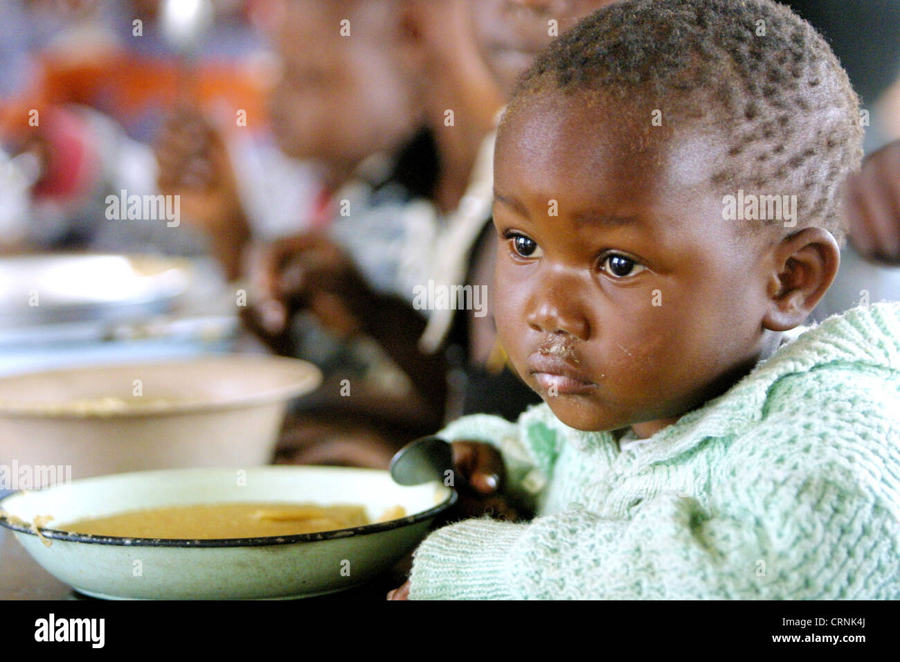 Food distribution to AIDS orphans Stock Photo - Alamy