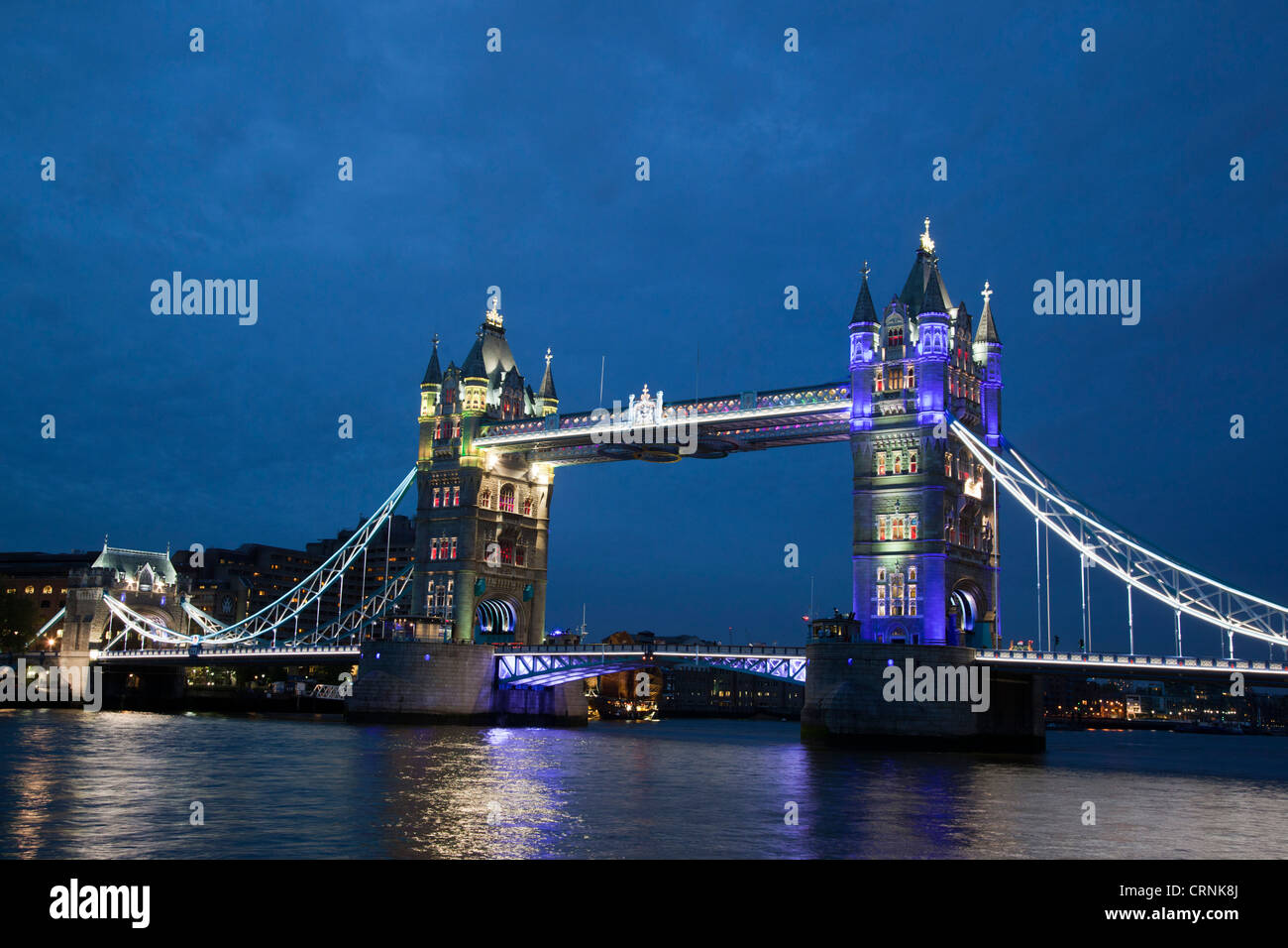 Illuminated Tower Bridge and the River Thames with colourful lighting ...