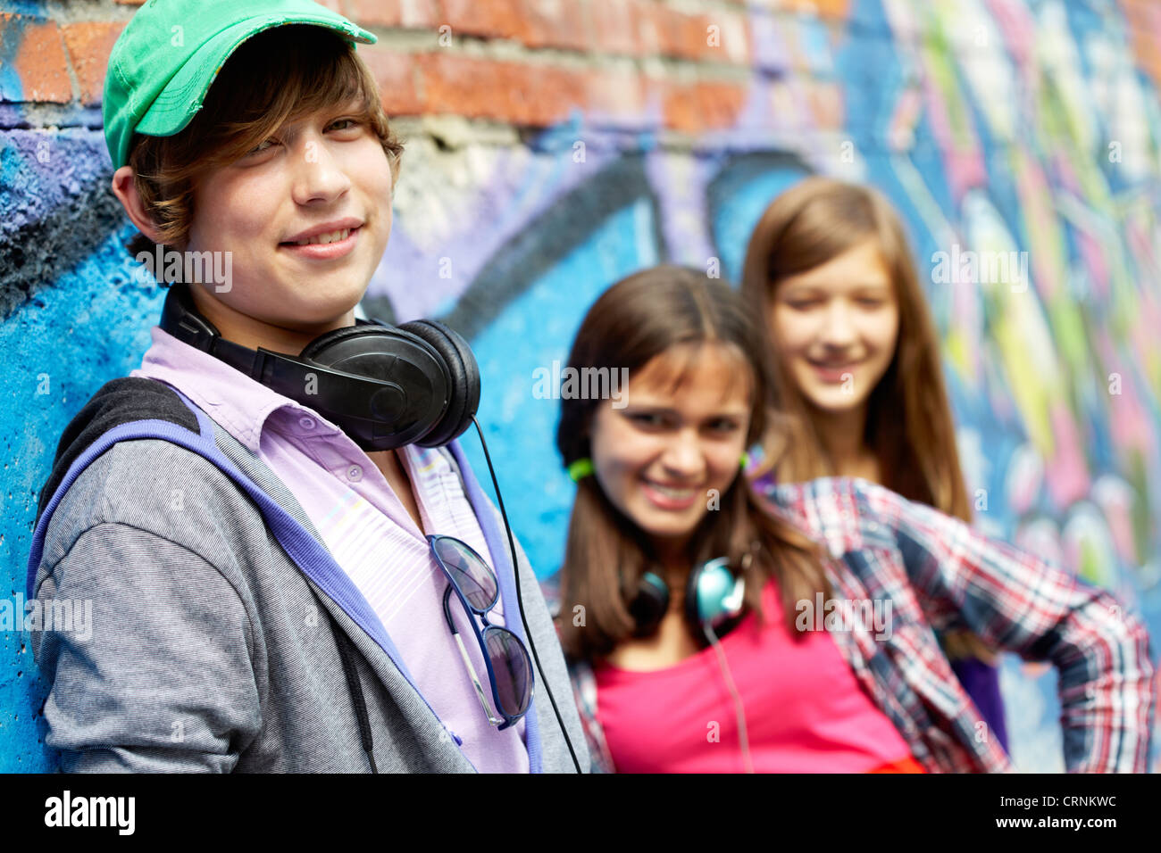 Cool teenagers hanging out together outdoors Stock Photo - Alamy