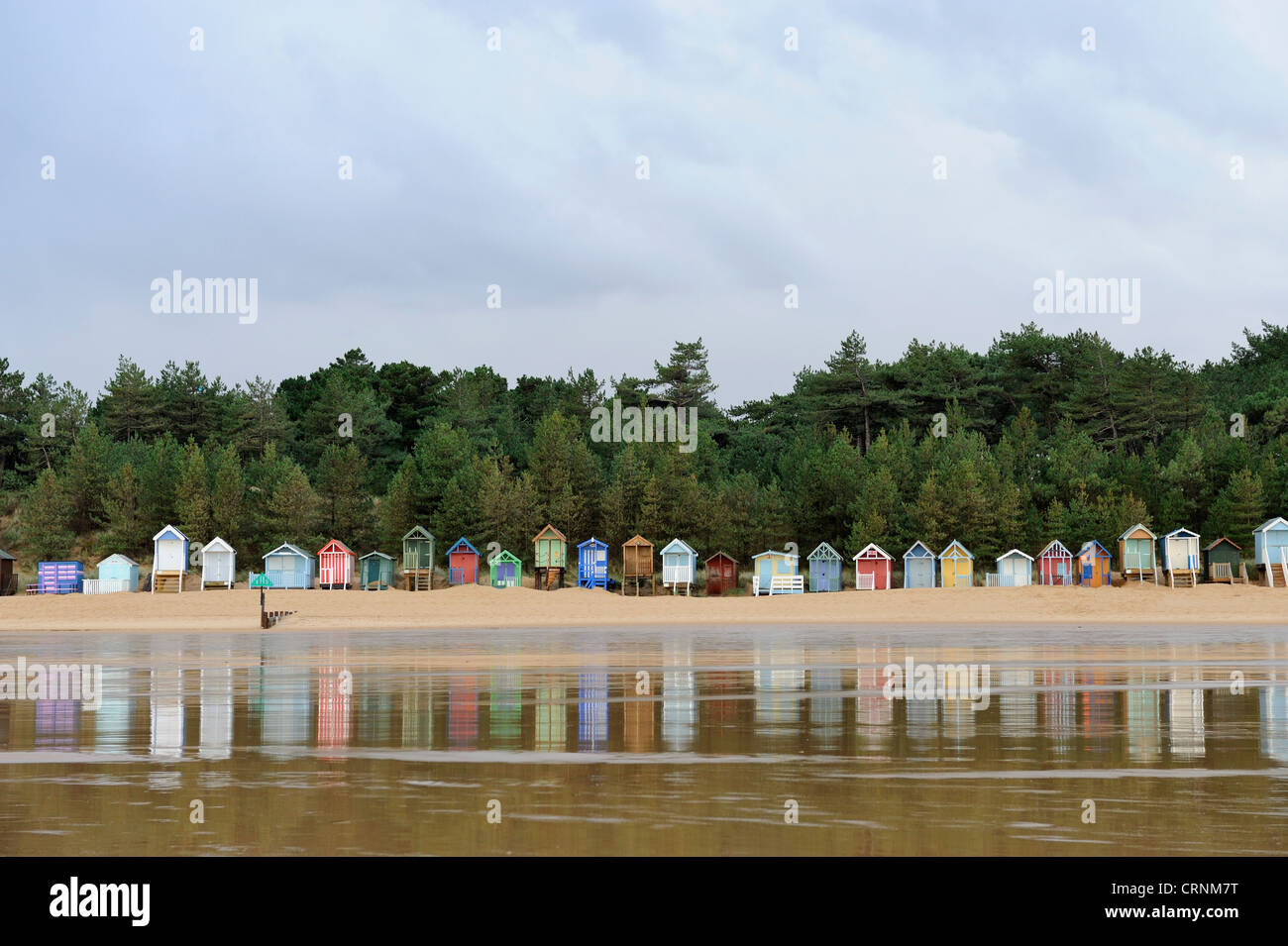 Beach huts along the seafront of the seaside town Wells-next-the-sea ...