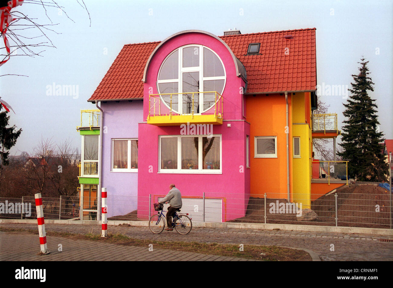 Colorful-painted, modern family home Stock Photo - Alamy