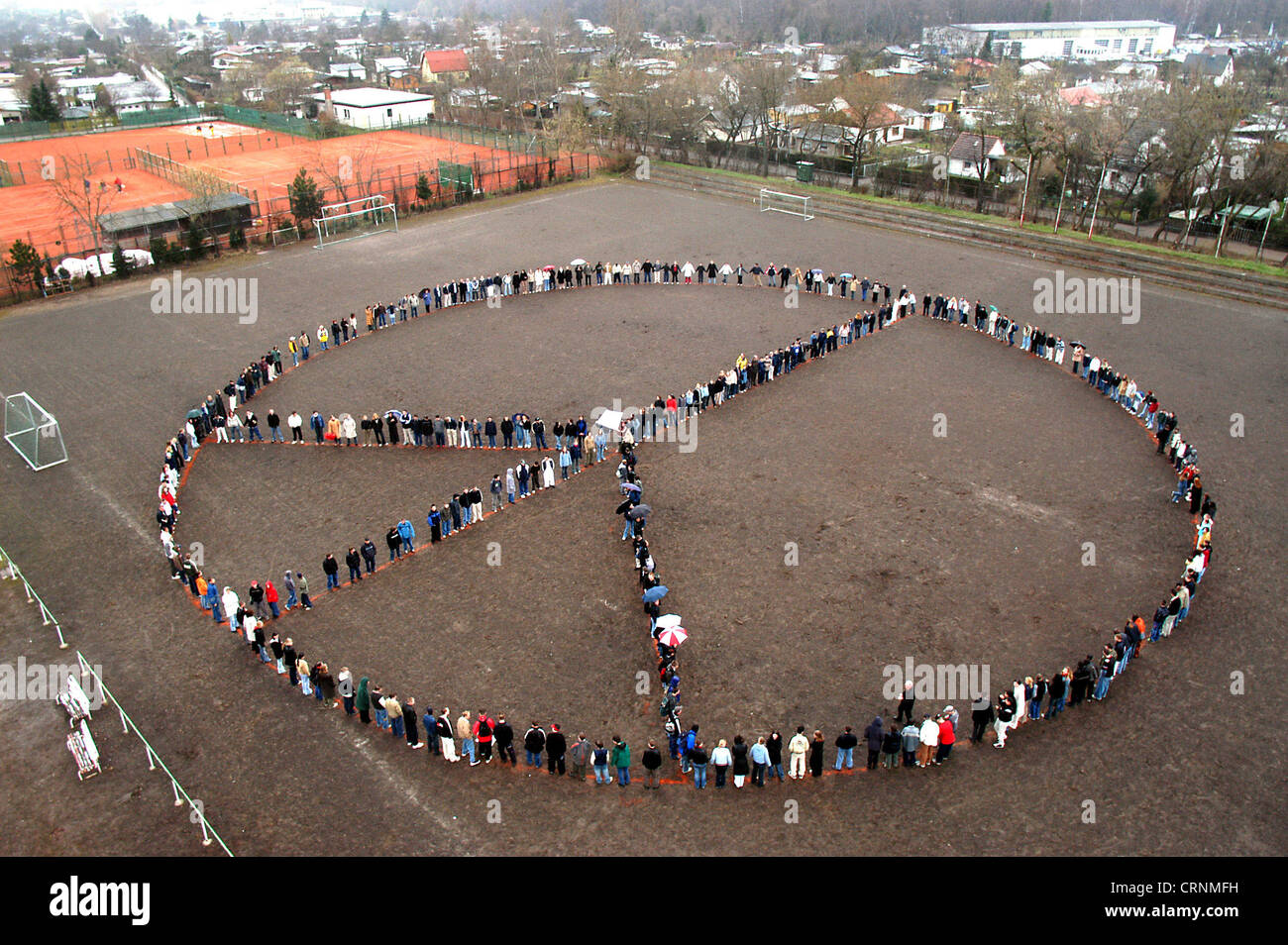 Students form a peace sign, Berlin Stock Photo - Alamy