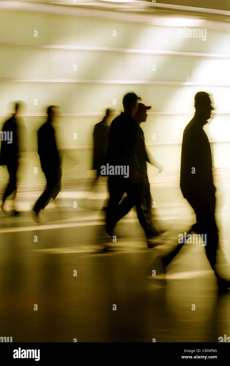 The silhouettes of people running in the same direction Stock Photo - Alamy