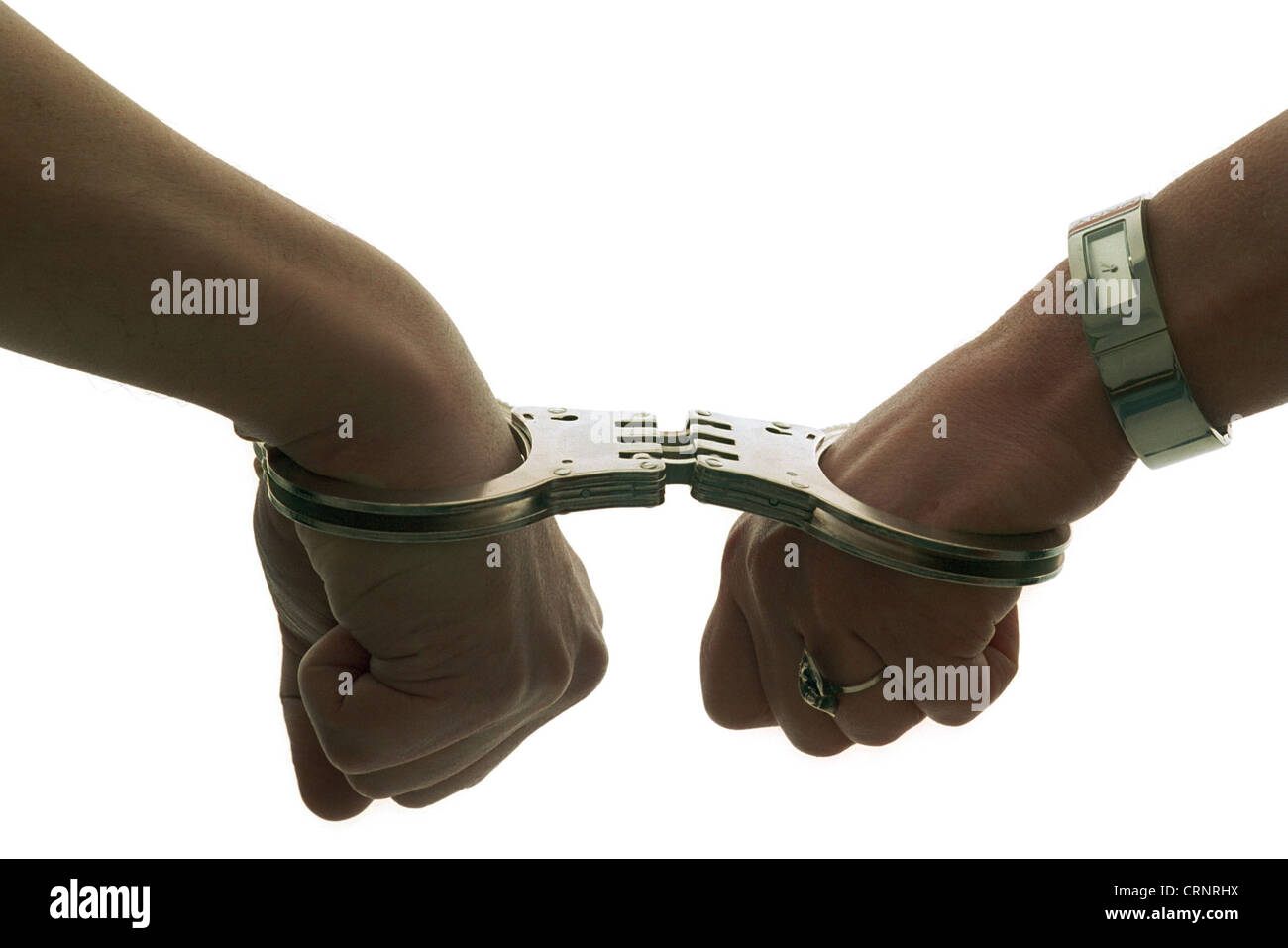 Woman and man with handcuffs tied to each other Stock Photo - Alamy