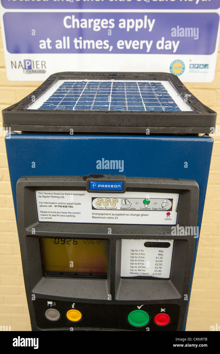 A solar powered car park ticket dispenser in Bridport, Dorset, UK Stock ...