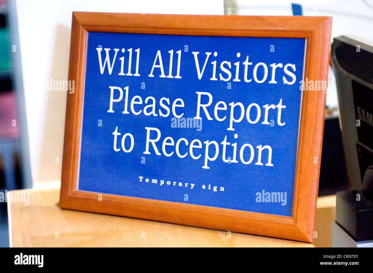 Hospital visitors sign on a blue background Stock Photo - Alamy