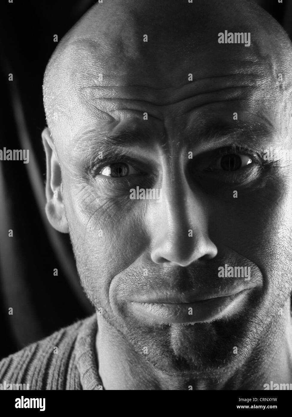 Man pulling faces Stock Photo - Alamy