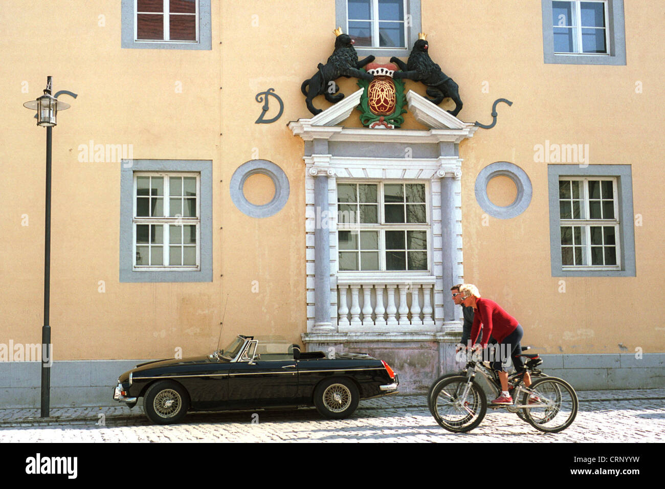A sports car in front of a half-timbered house Stock Photo - Alamy
