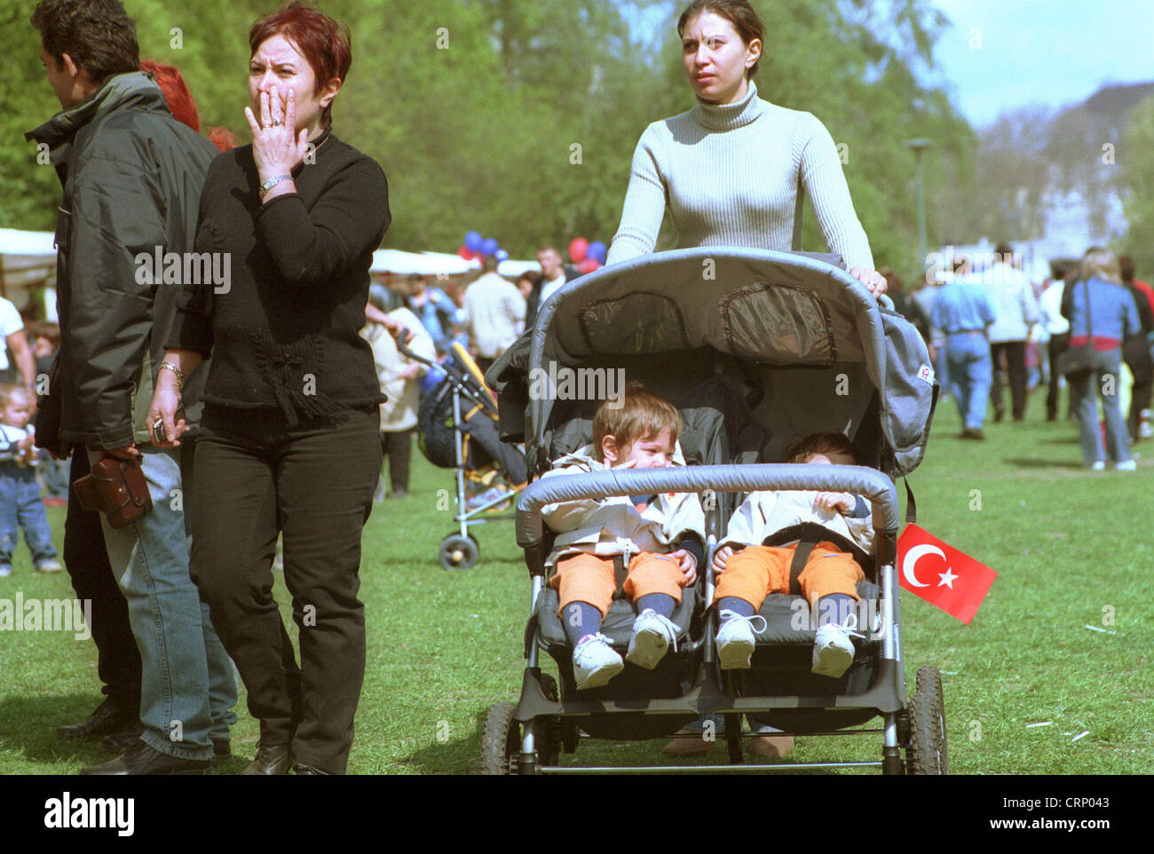 Turkish young mother with Double Stroller Stock Photo - Alamy