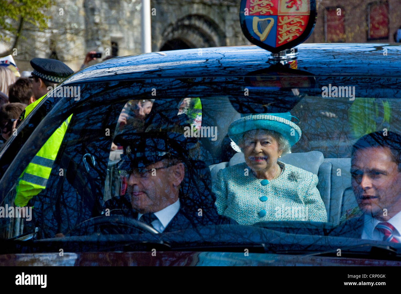 Queen Elizabeth II travelling by car to visit the Yorkshire Museum in ...