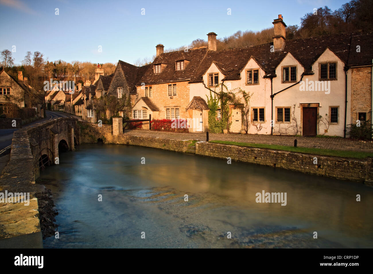The River Bybrook, a tributary of the Bristol Avon, flowing under a ...