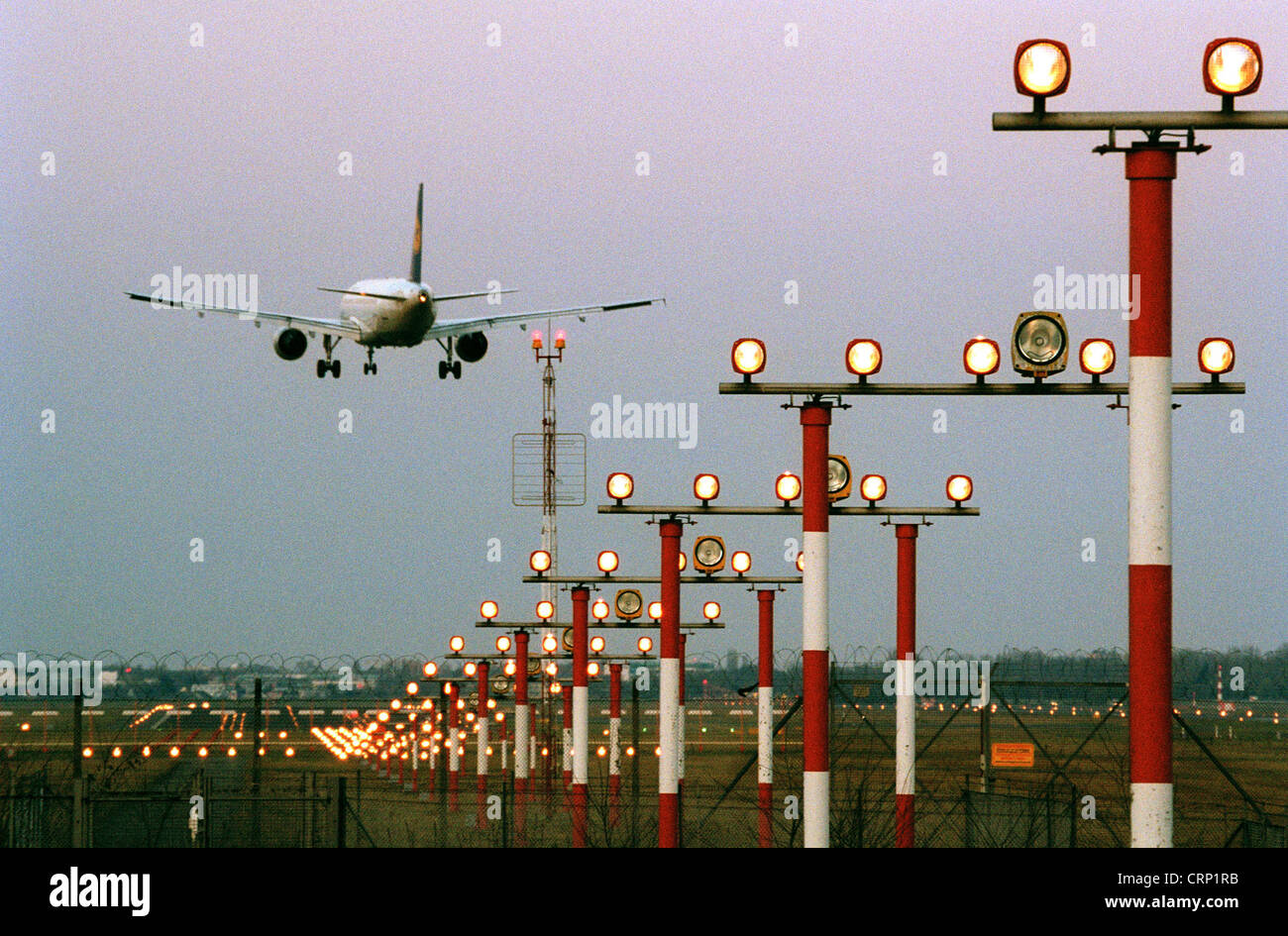 Approach lights and airplane landing at Tegel Stock Photo - Alamy