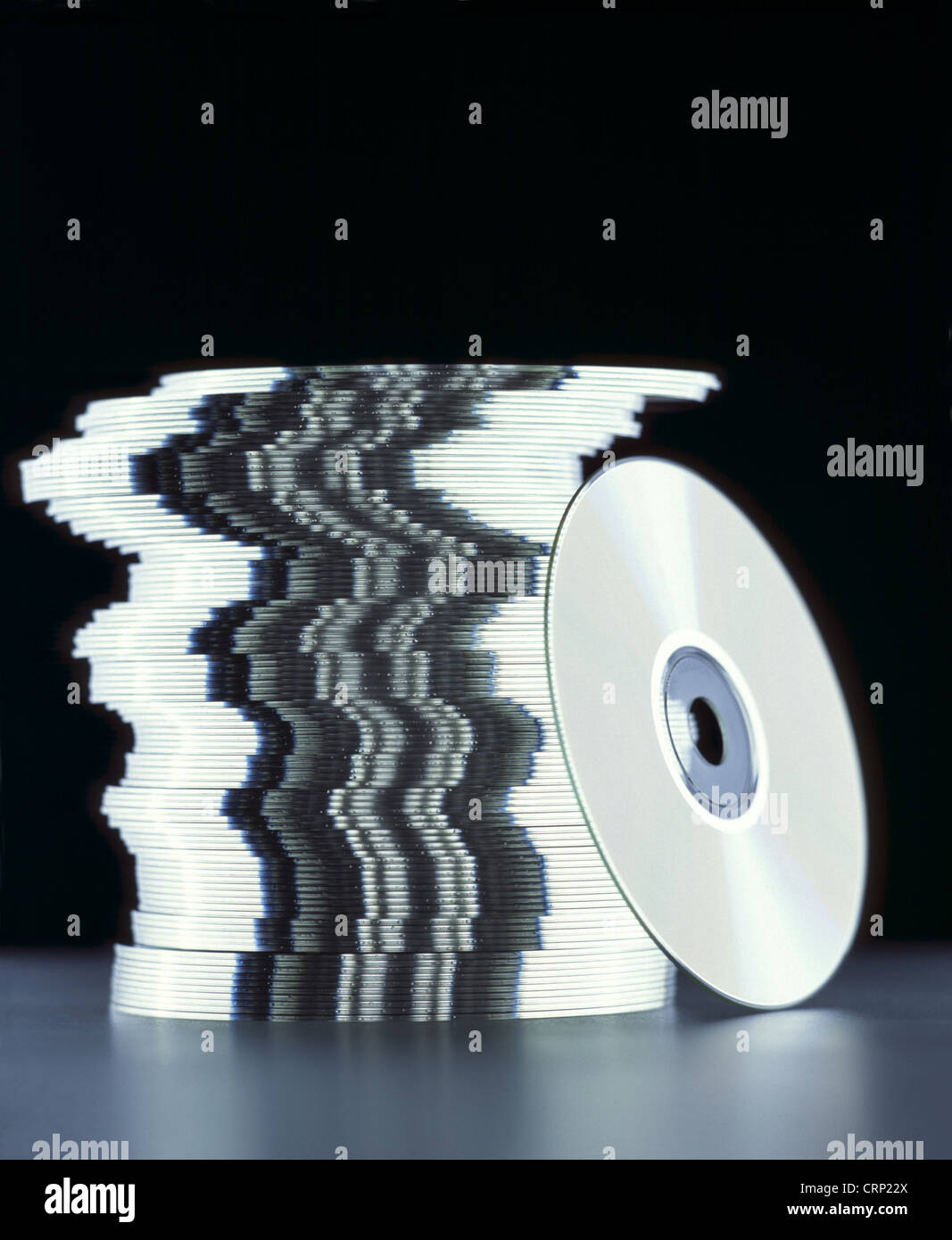 CD stack on a black background Stock Photo - Alamy