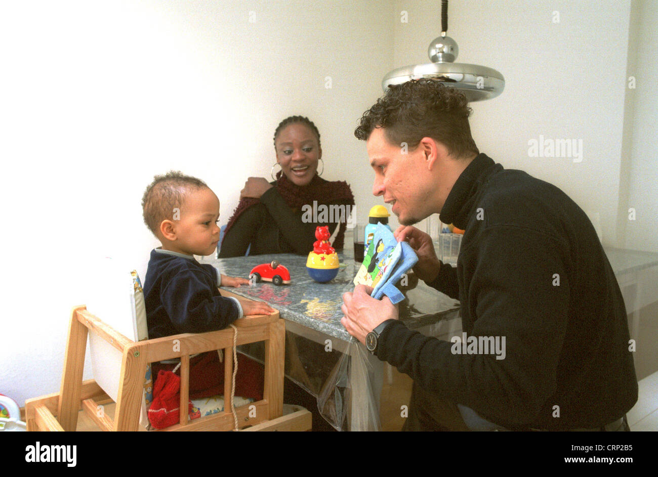 German-Angolan couple with daughter, Berlin Stock Photo - Alamy