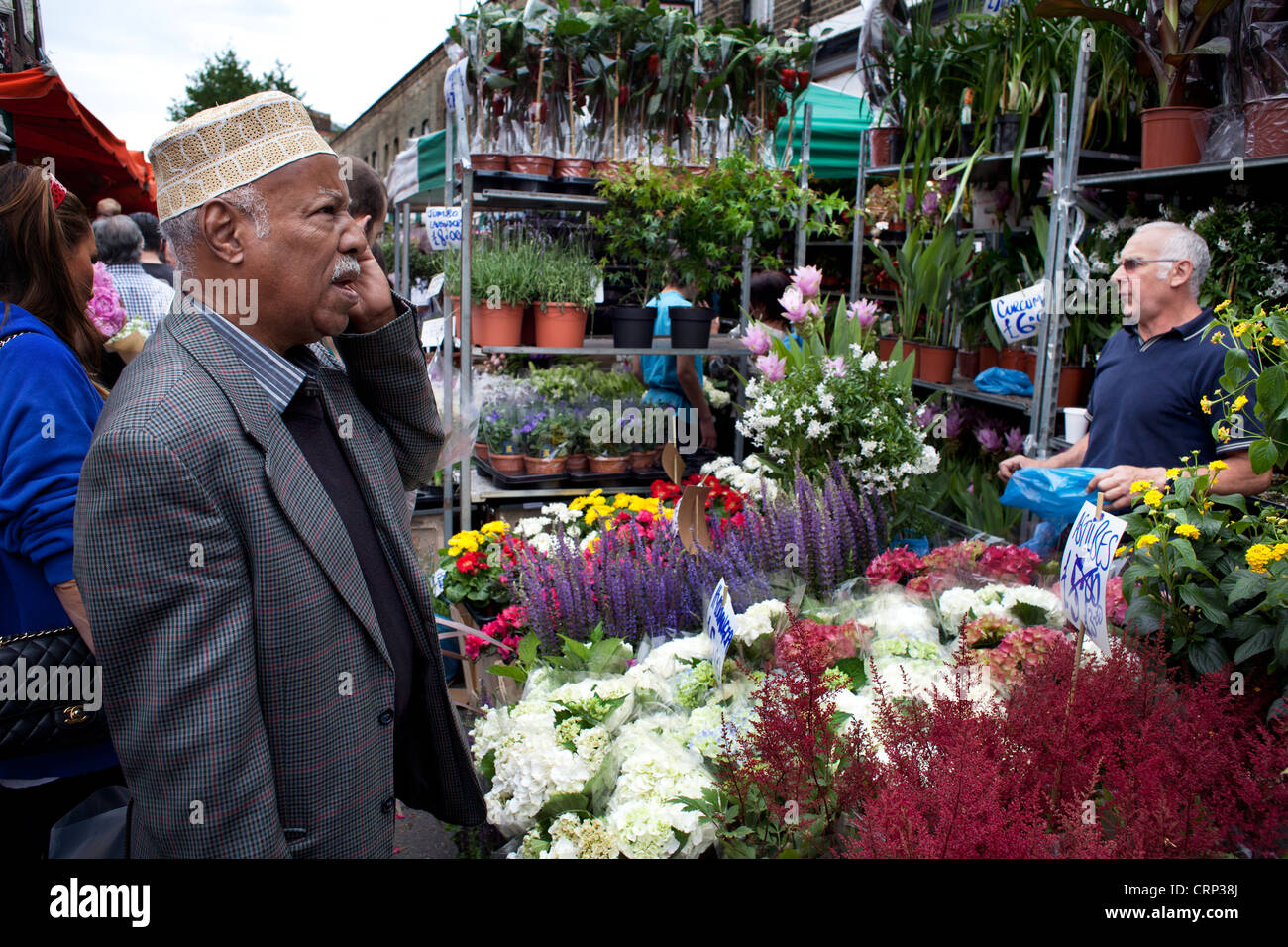 Buyers and sellers at East London's famous Sunday flower market on ...