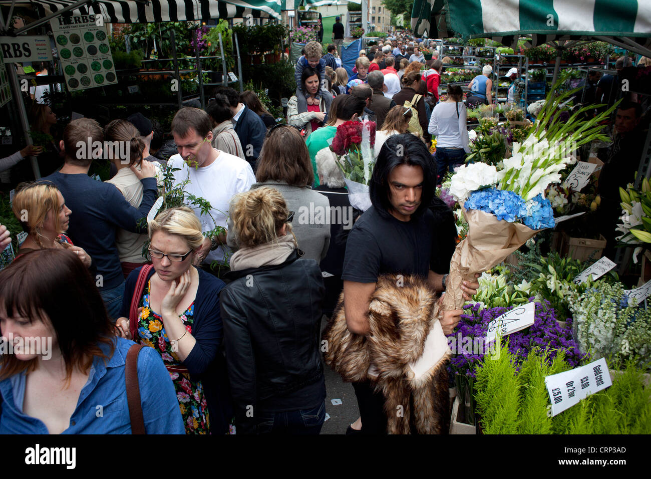 Buyers and sellers at East London's famous Sunday flower market on ...