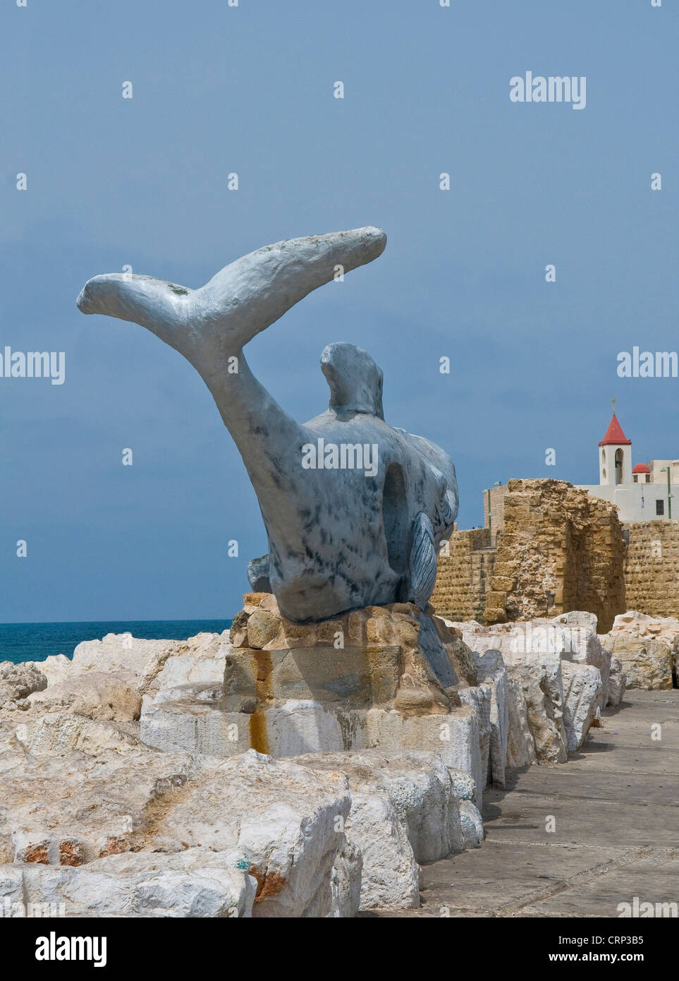 Jonah and the whale sculpture near Acre port Stock Photo - Alamy