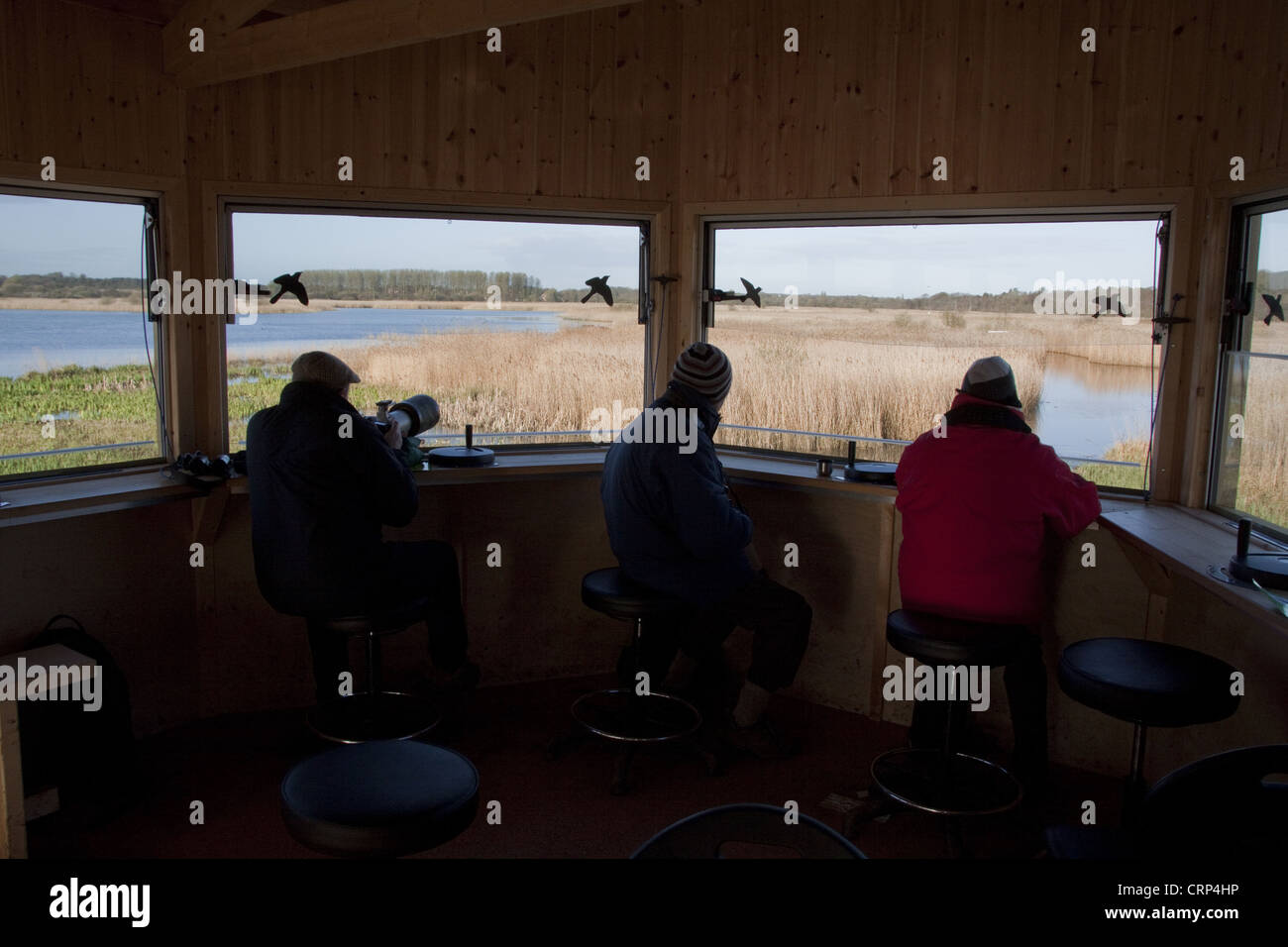 The New Island Mere hide at RSPB Minsmere, people looking west over ...
