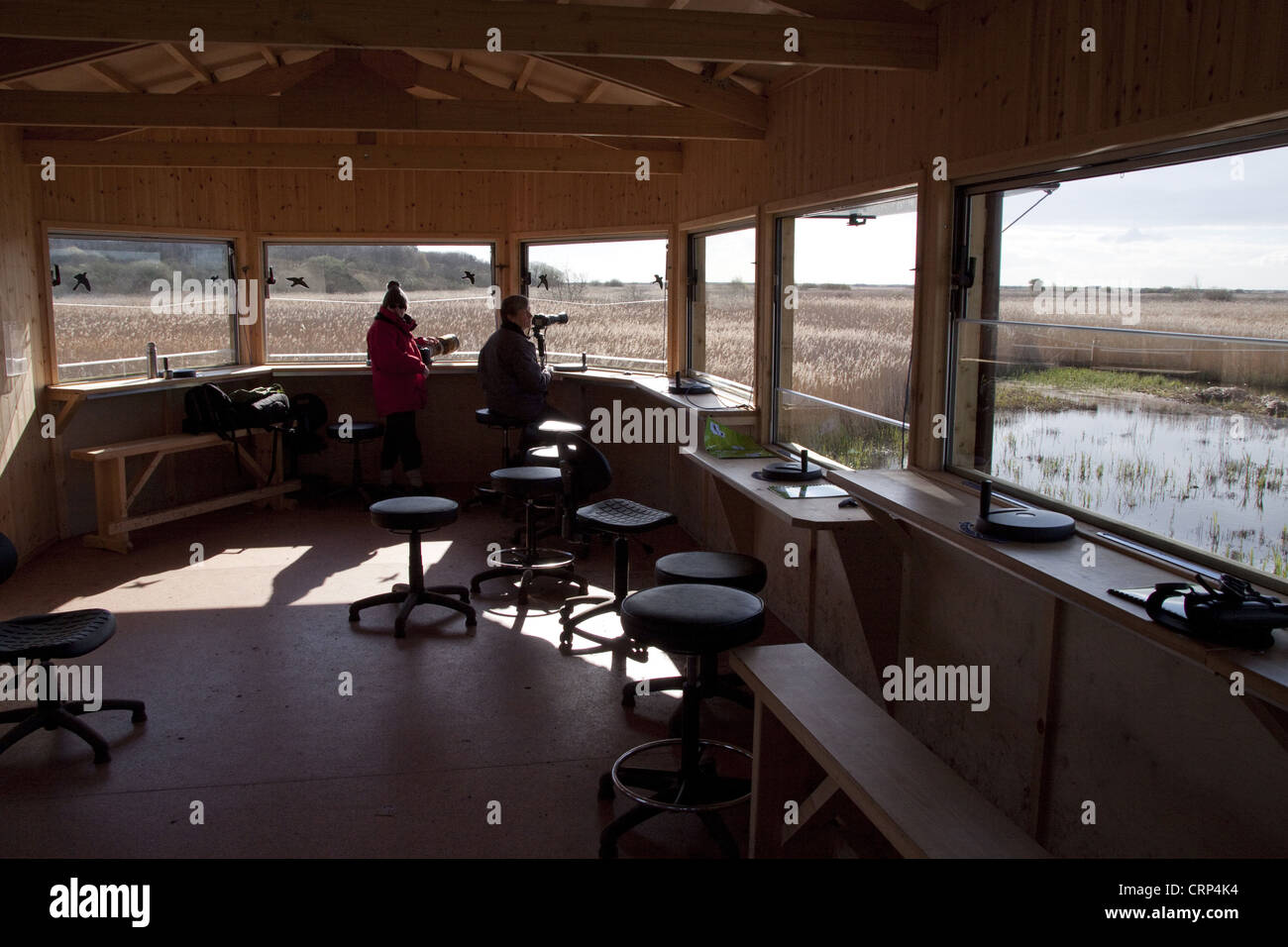 The New Island Mere hide at RSPB Minsmere, birdwatchers looking east ...