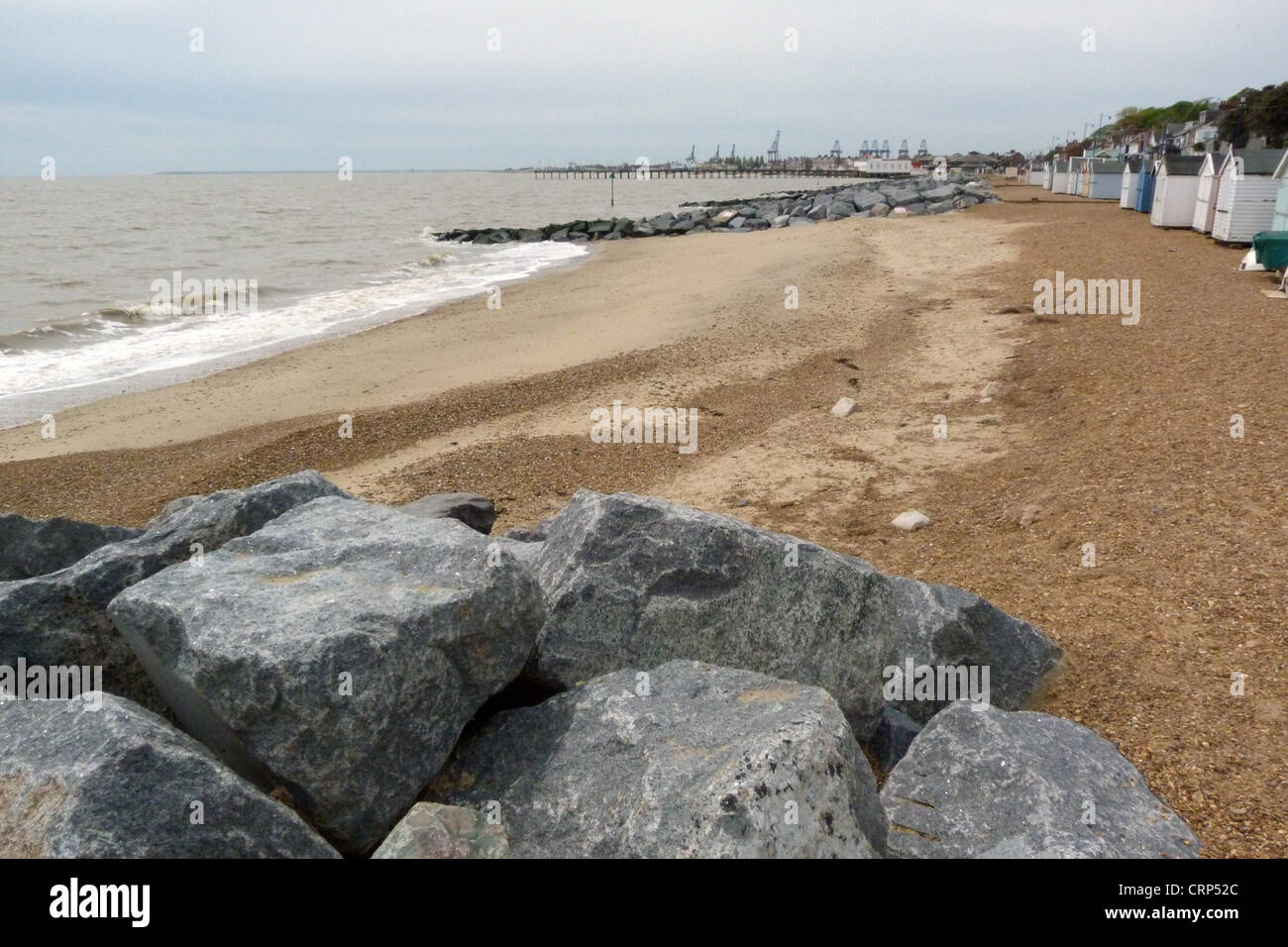 Granite rock groynes protect the beach at Felixstowe Suffolk from ...