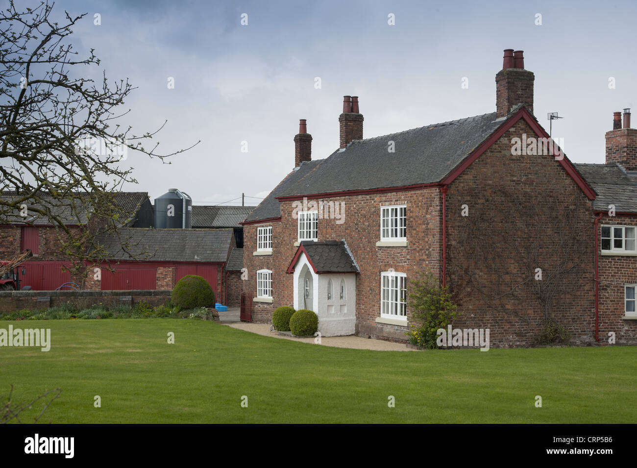 Red brick farmhouse, Cheshire, England, april Stock Photo - Alamy