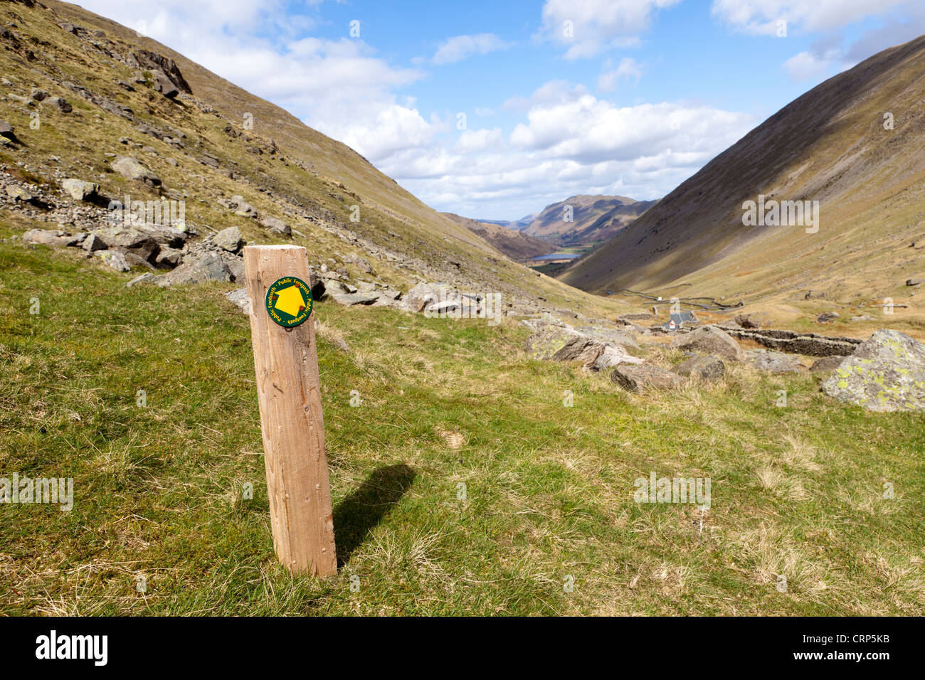 A public footpath waymark in the Kirkstone Pass, Cumbria looking down ...