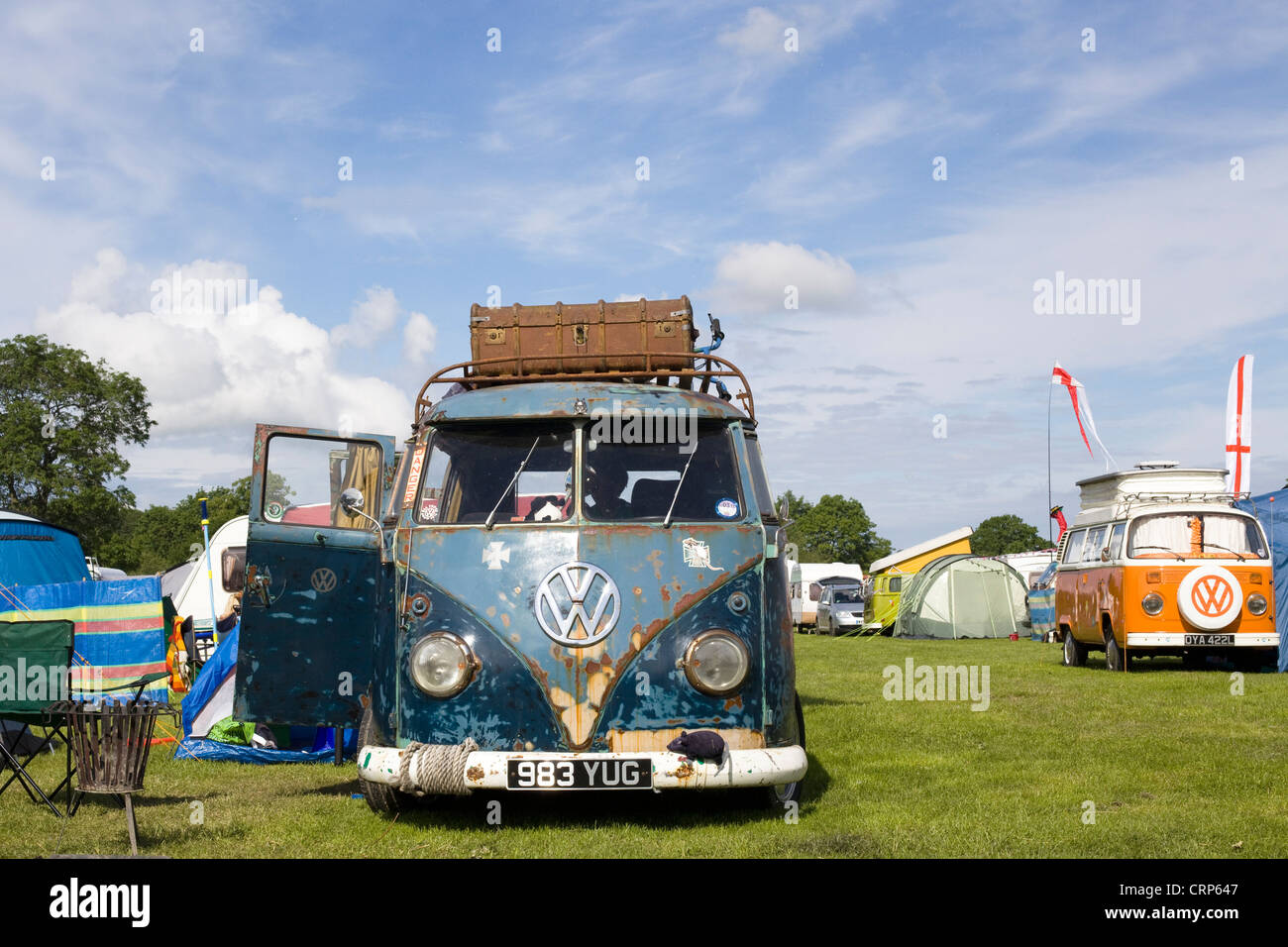 Volkswagen Split screen Camper van with vintage cases on the top at a ...