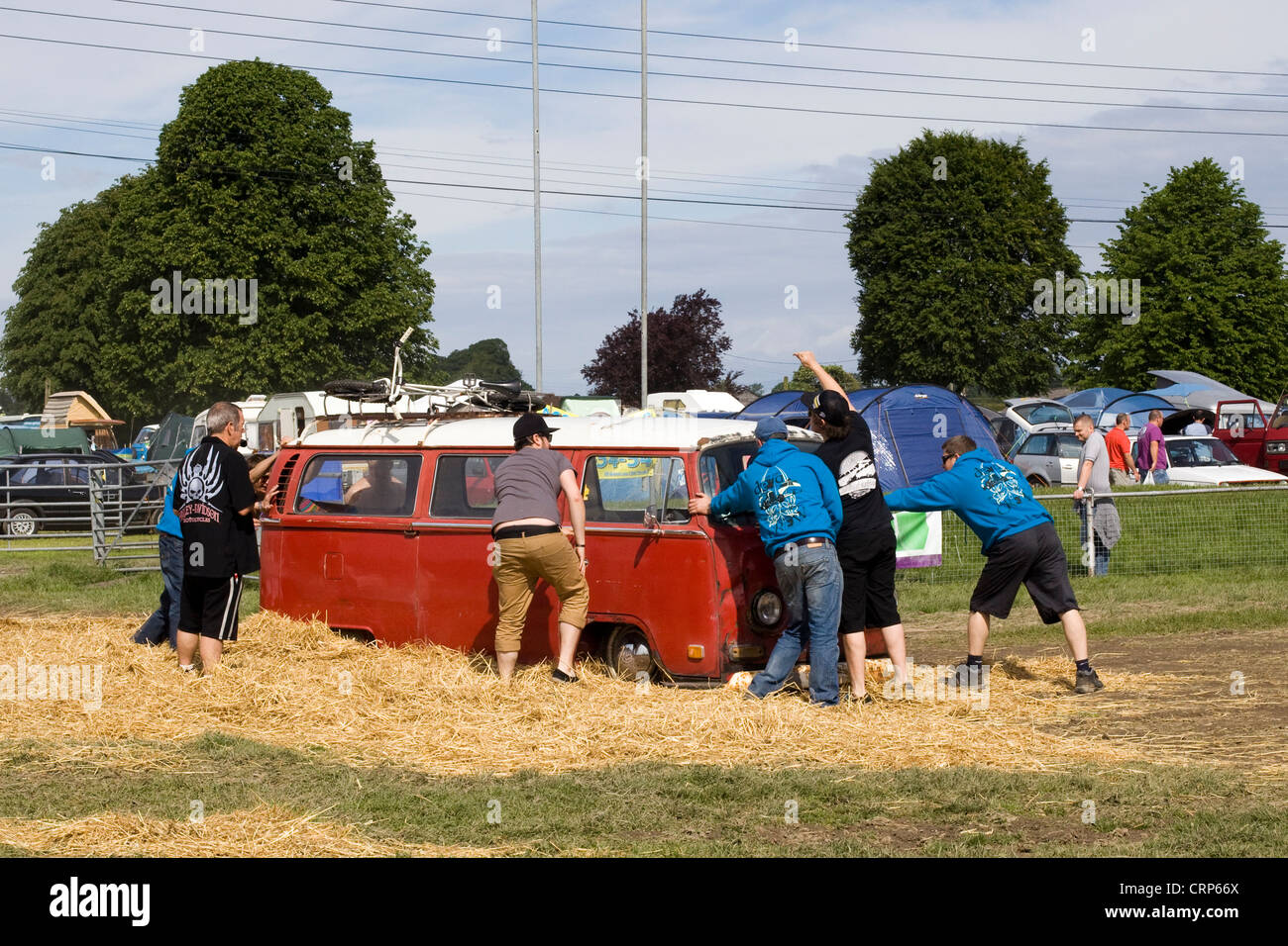 Volkswagen Camper van being pushed after it got stuck at a show in ...