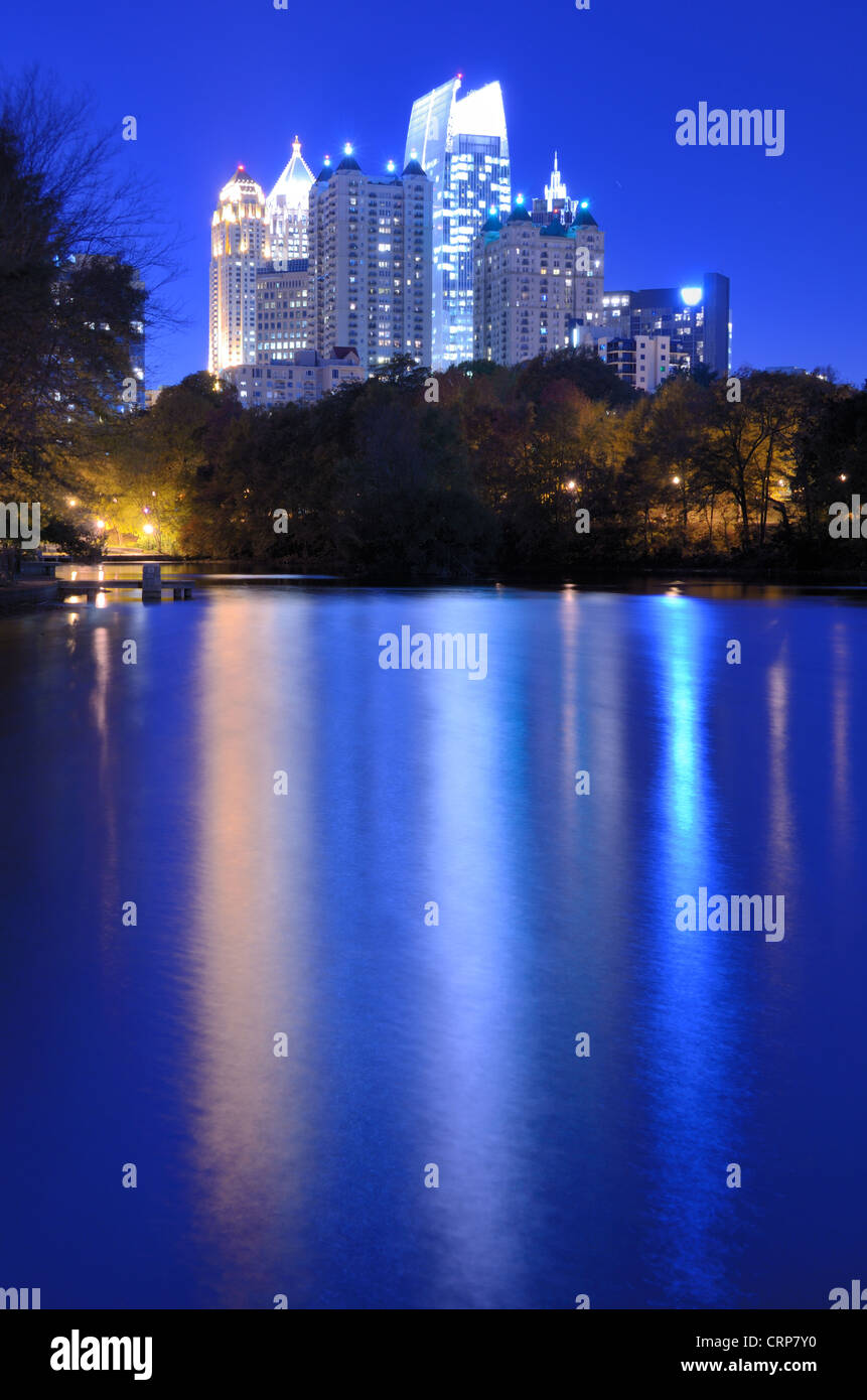 Skyline and reflections of midtown Atlanta, Georgia in Lake Meer from ...