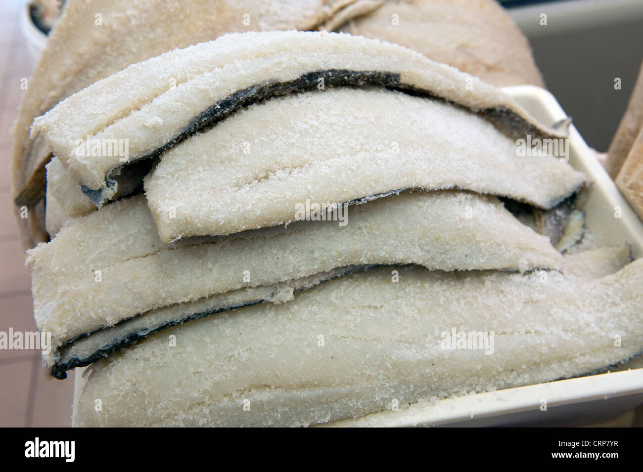 Baccalà, slabs of salt cod, in an Italian market Stock Photo - Alamy