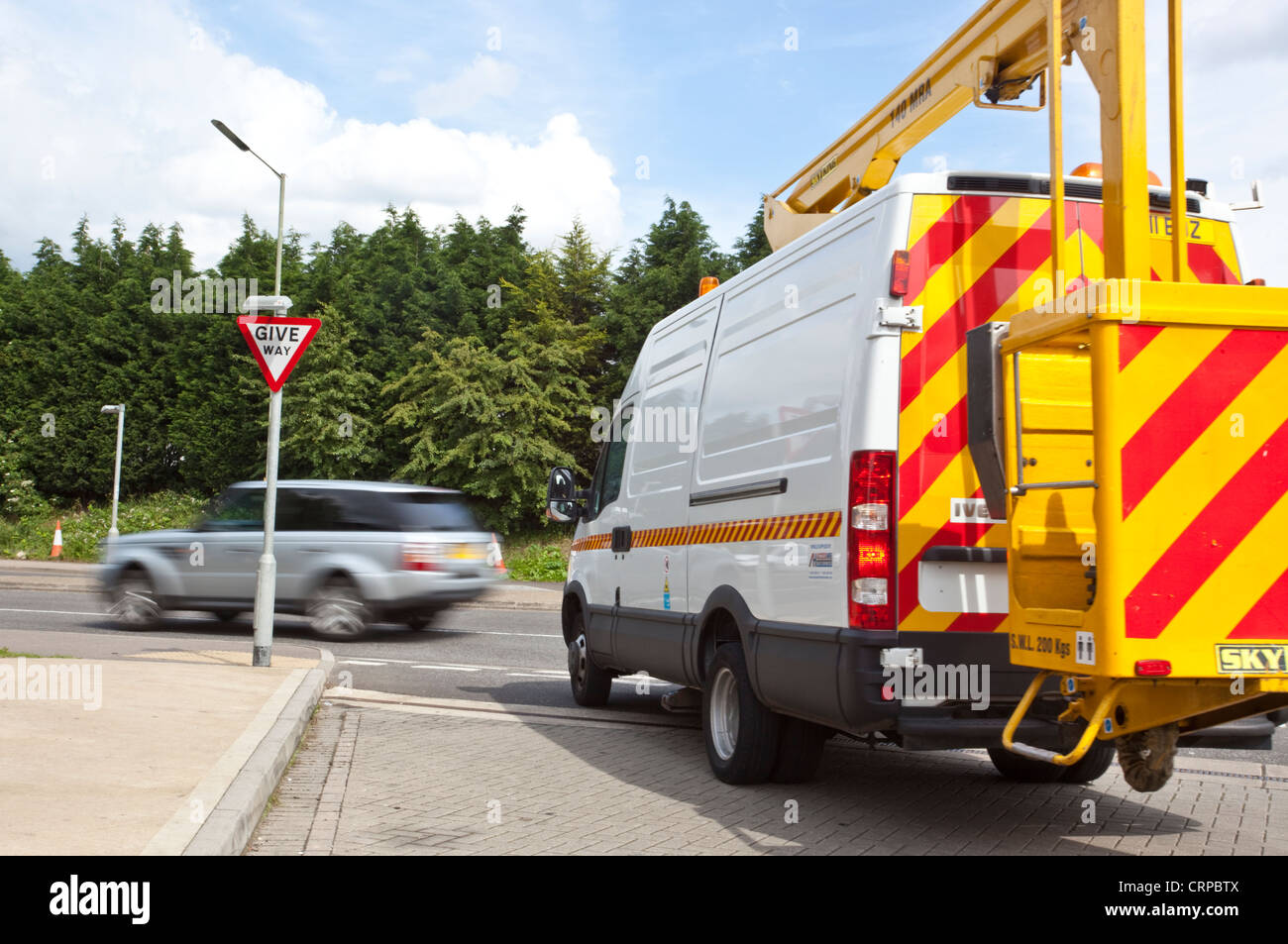 Van stopped at give way sign just before entering a road, London ...