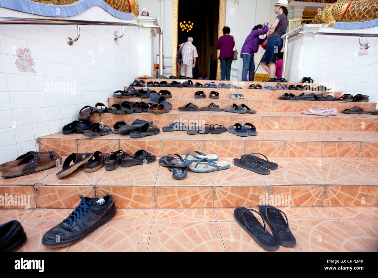 Shoes mess on buddhist's stairs temple, Chiang mai Thailand Stock Photo ...