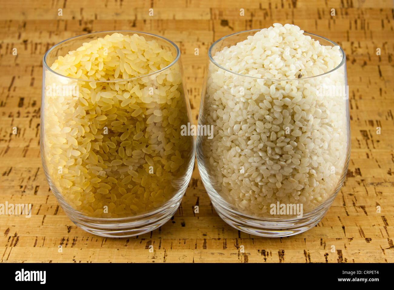 Two varieties of rice inside two transparent glasses Stock Photo - Alamy