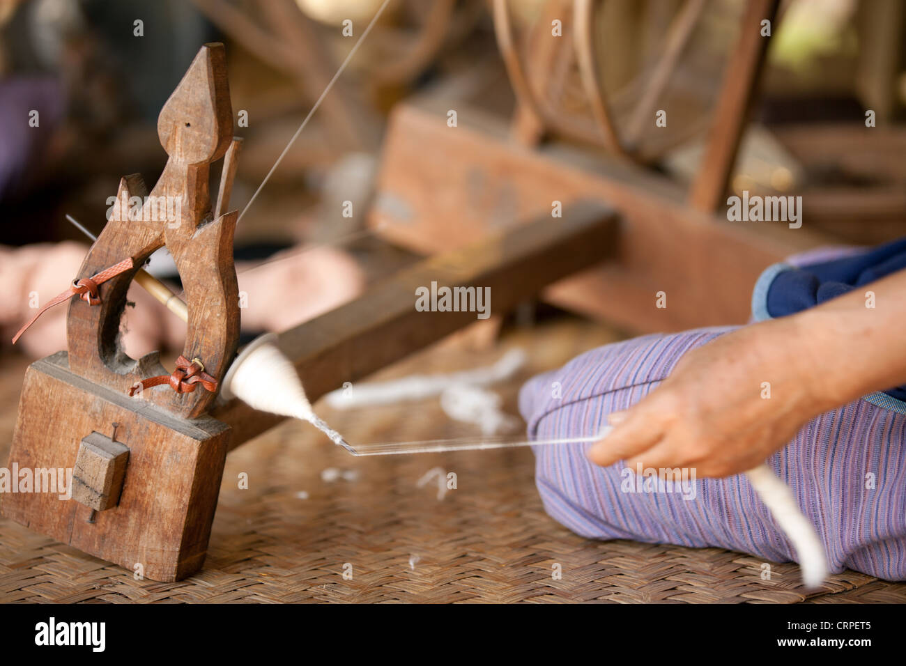Asian woman spinning cotton, Chiang mai, Thailand Stock Photo - Alamy
