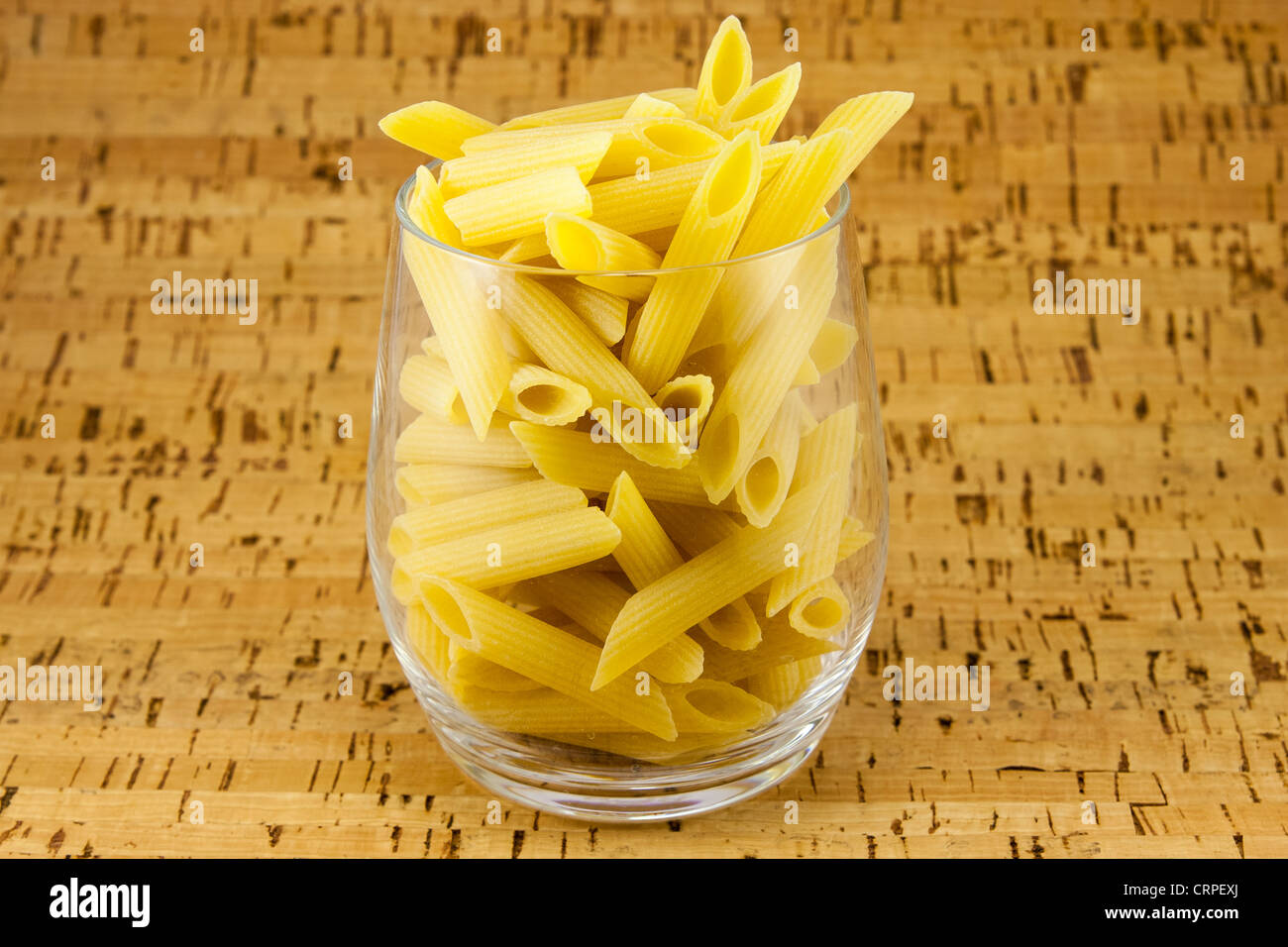 Pens pasta inside transparent glass Stock Photo - Alamy