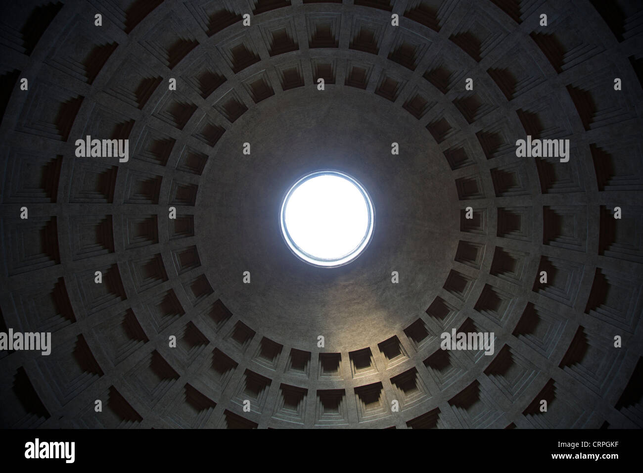 Glowing oculus centered in coffered dome of the Pantheon Stock Photo ...