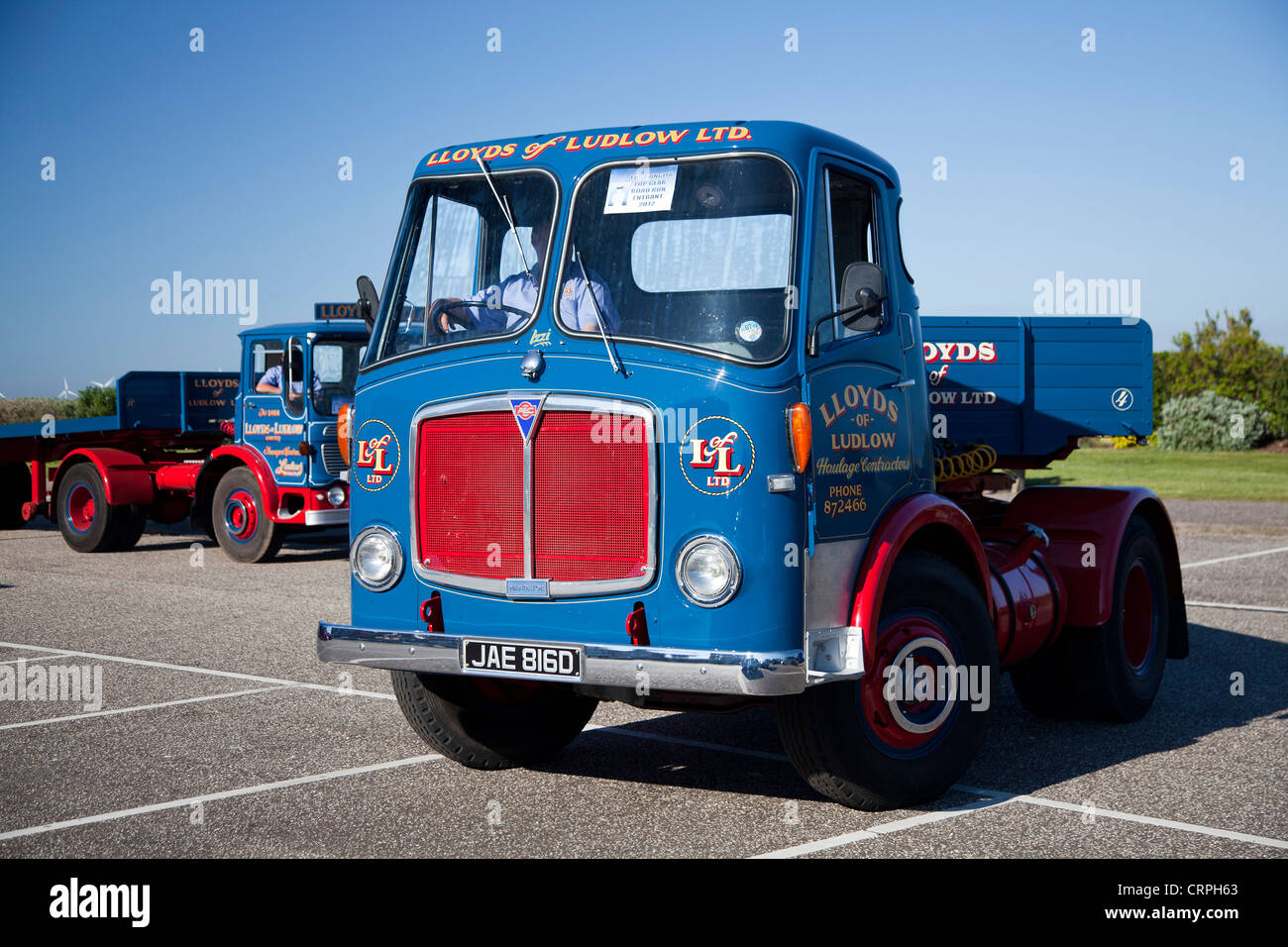 Restored AEC Mandators with flatbed trailers parking up during the 2012 ...