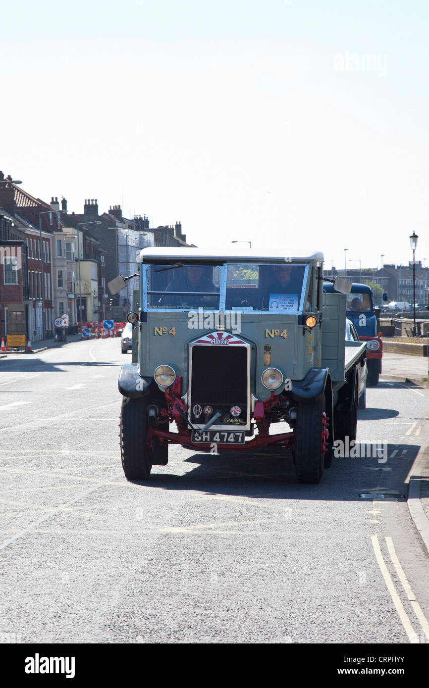 1935 Albion ML55 flatbed lorry driving down Hall Quay at Great Yarmouth ...